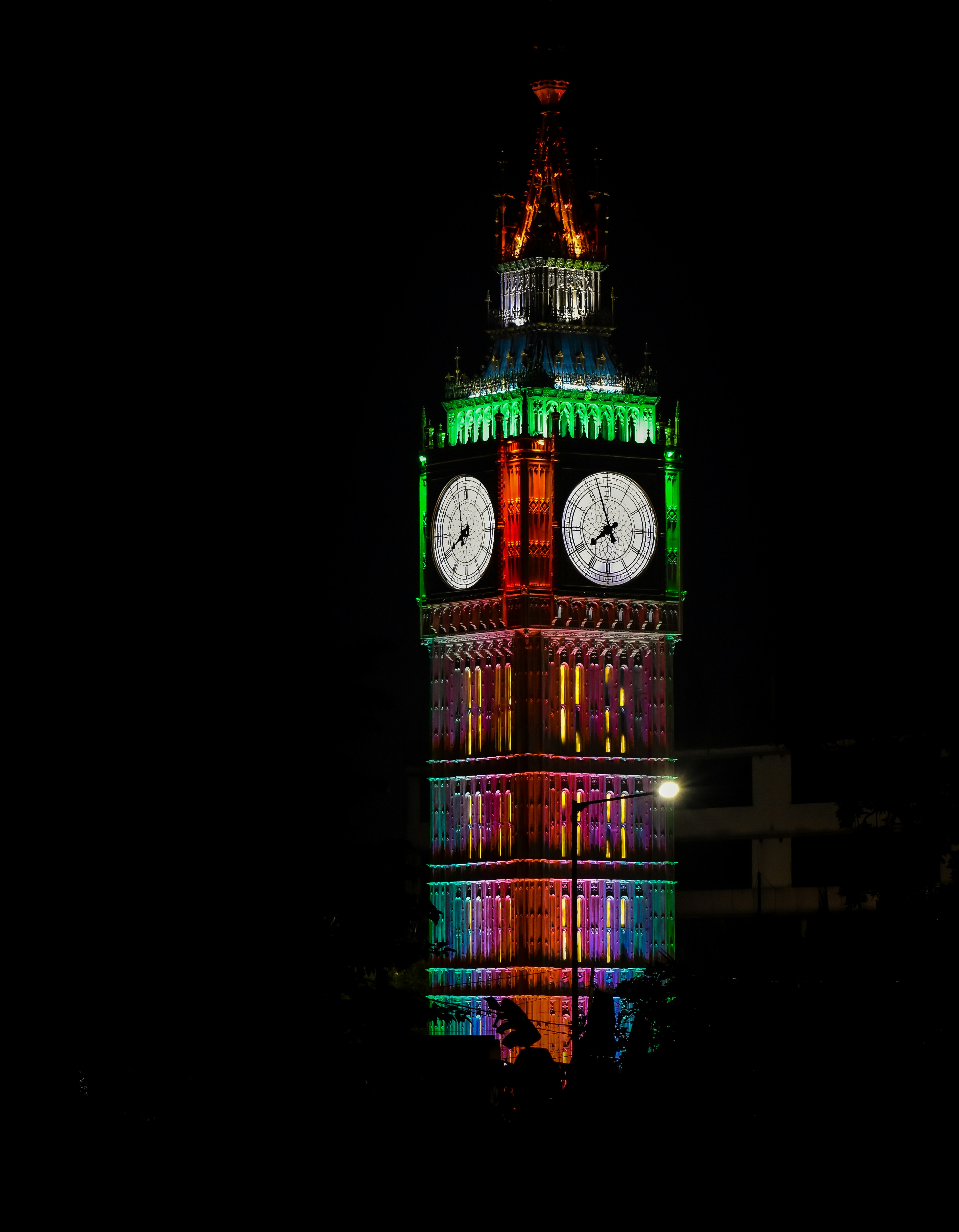 Prismatic Crown: Big Ben Lit in Rainbow Night Lights