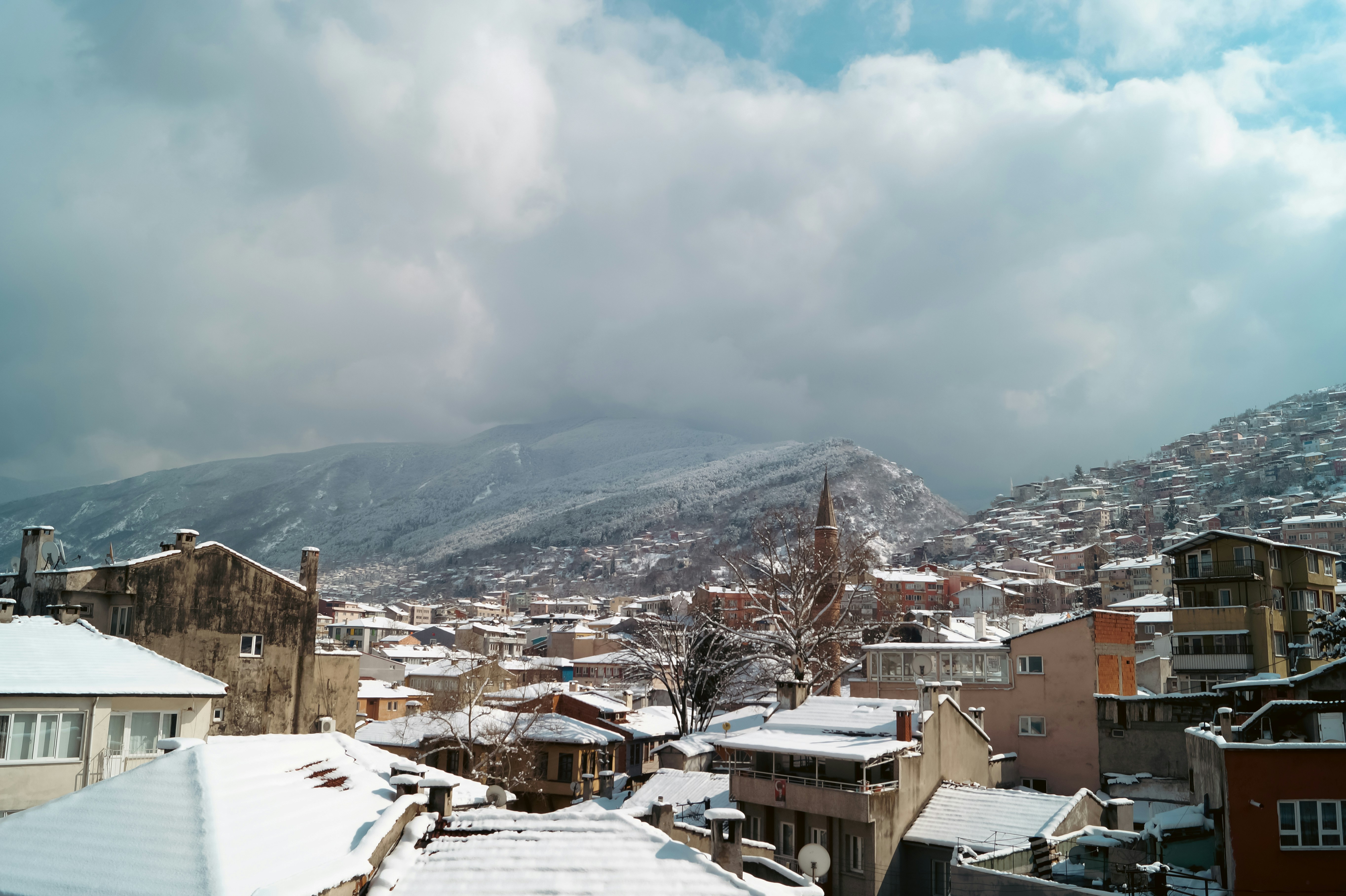 A view of a city with a mountain in the background photo – Free Bursa ...