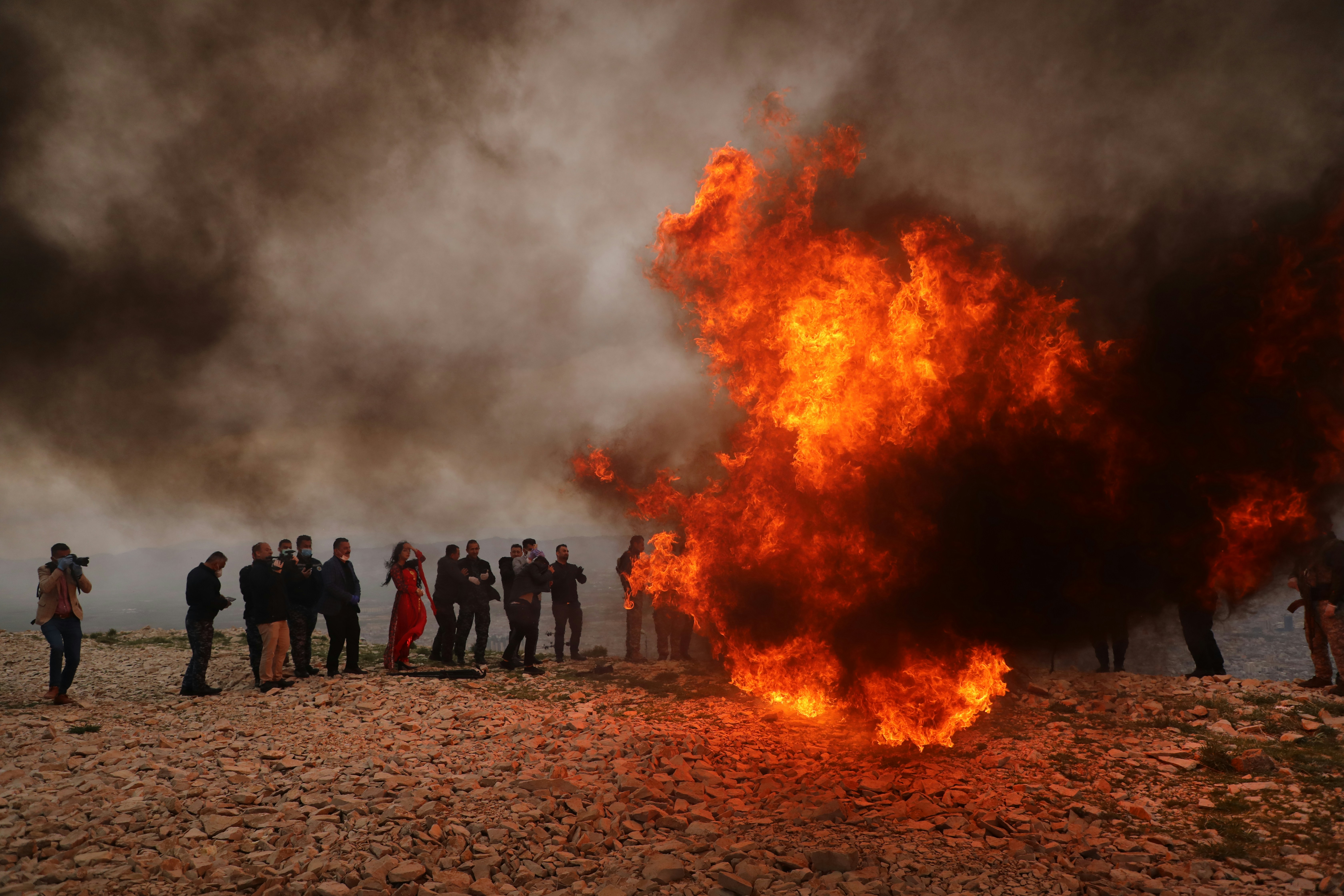 Desert Inferno: Spectators Confront a Towering Fireball