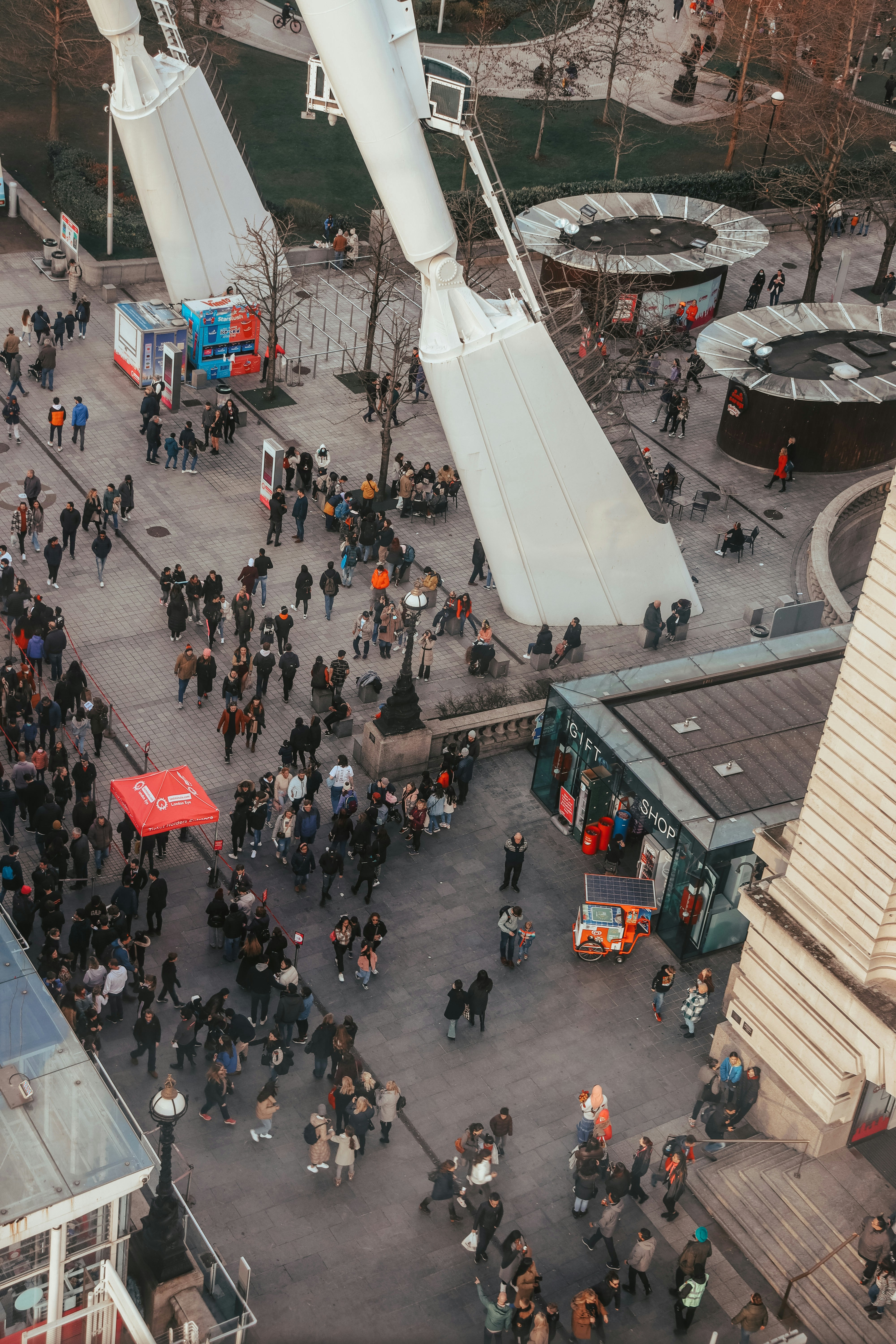 Elevated Agora: A Crowd Converges Under Monumental Rails