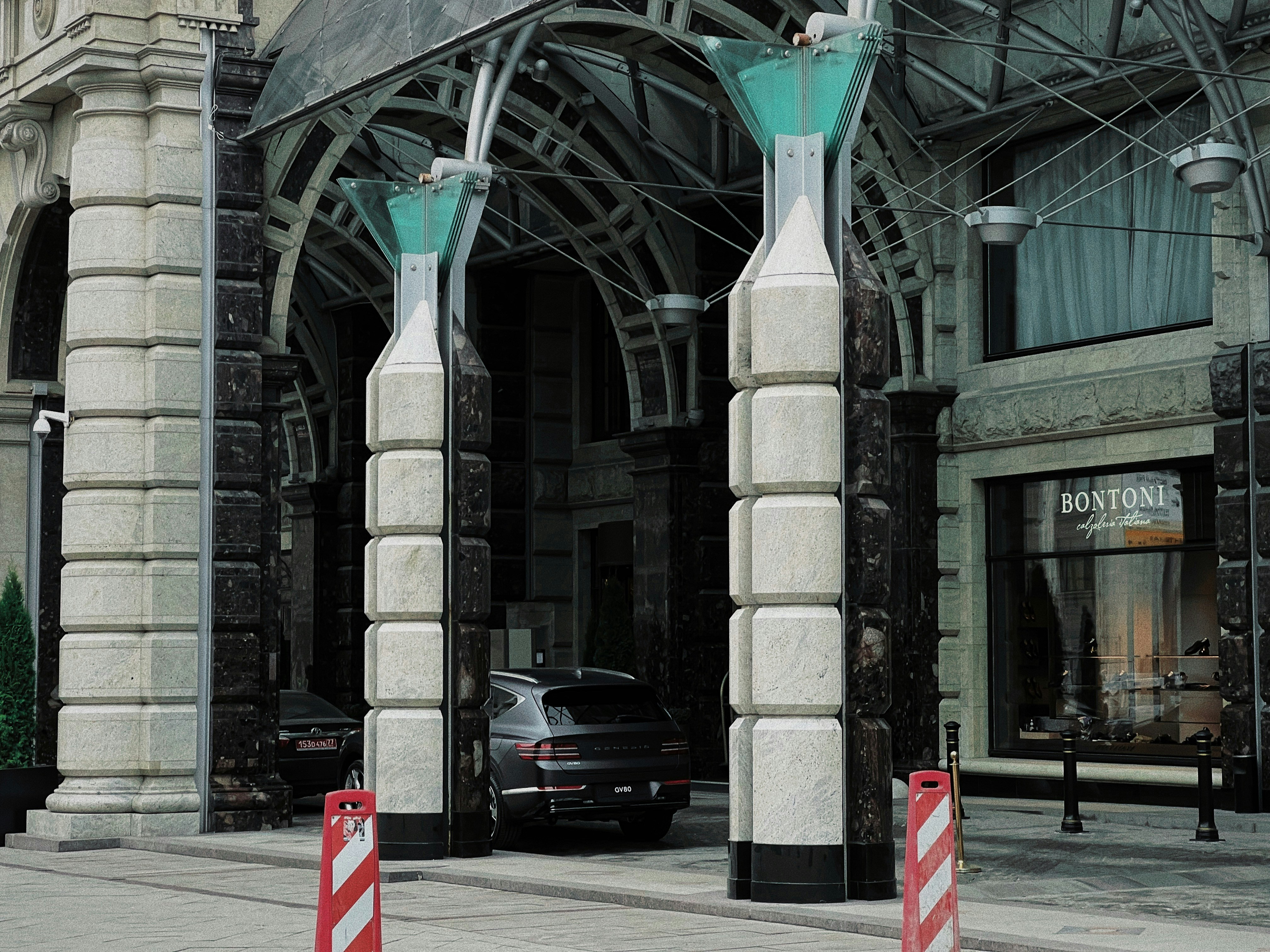 a car is parked in front of a building