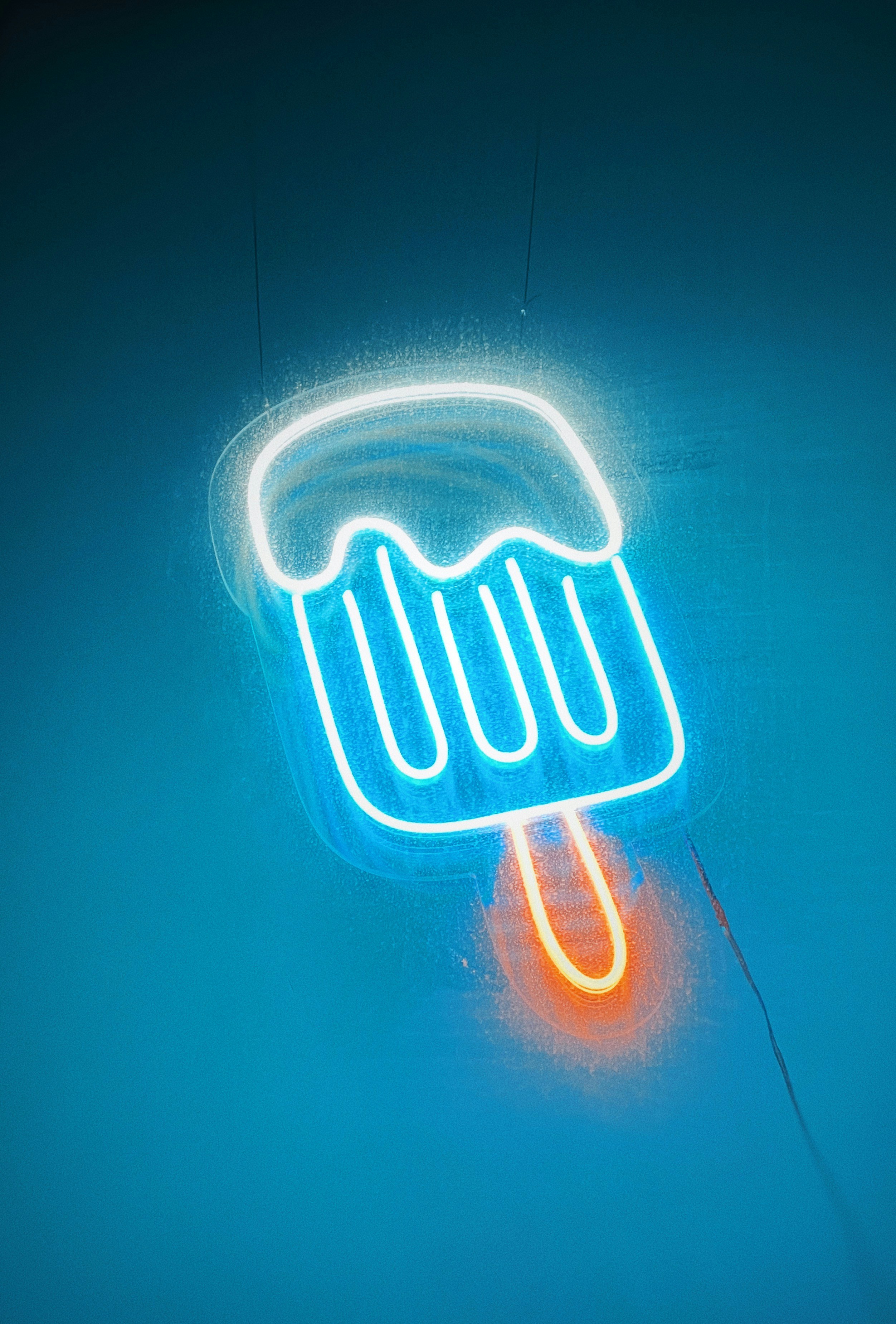Neon Popsicle: A Glowing Ice Cream Outline in Electric Blue