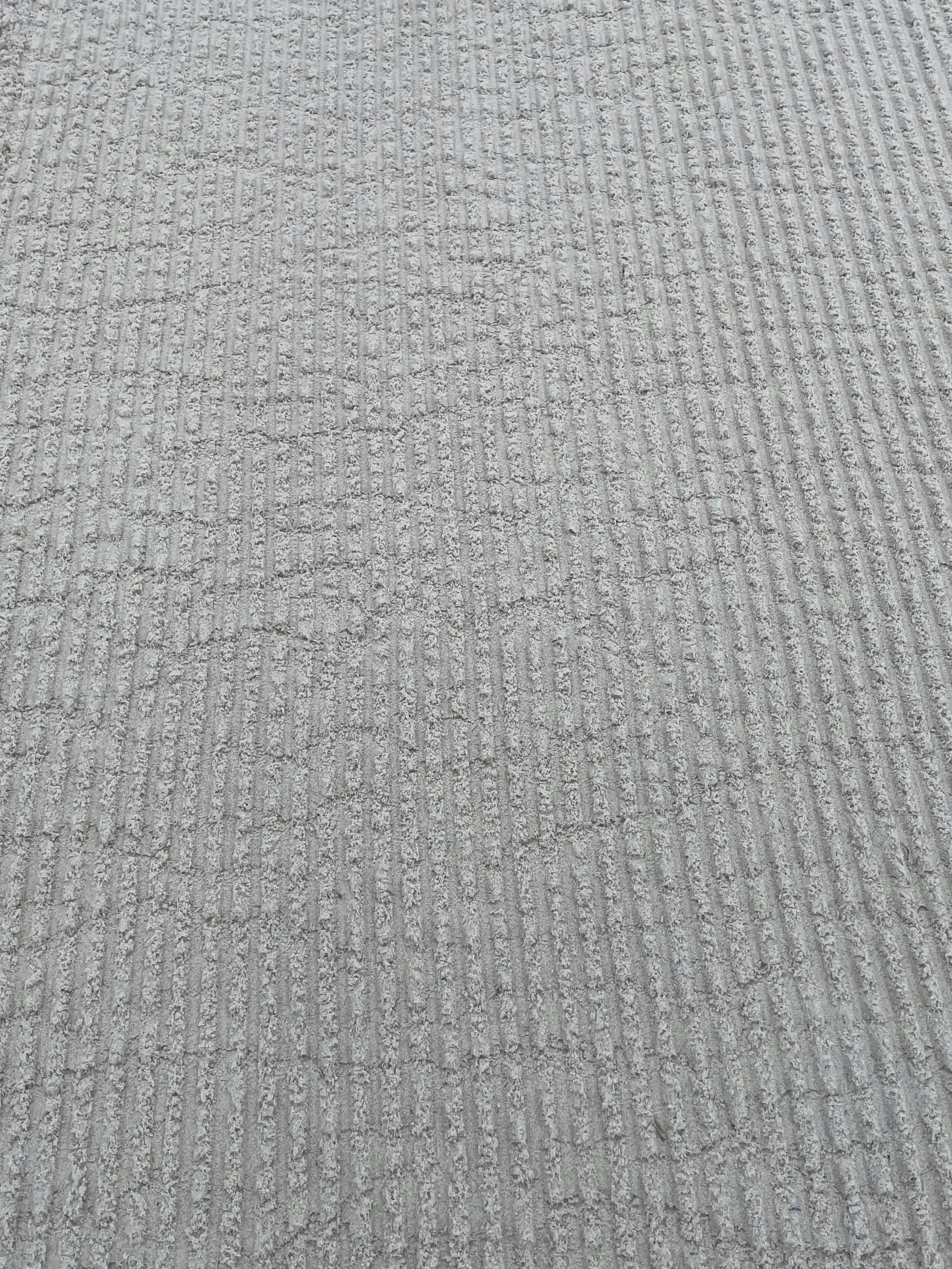 Ribbed Quietude: Close-Up of Concrete Grooves