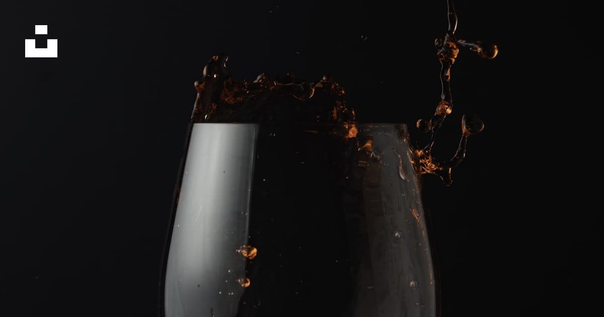 A Glass Of Wine Is Being Poured Into It Photo Free Wine Image On Unsplash