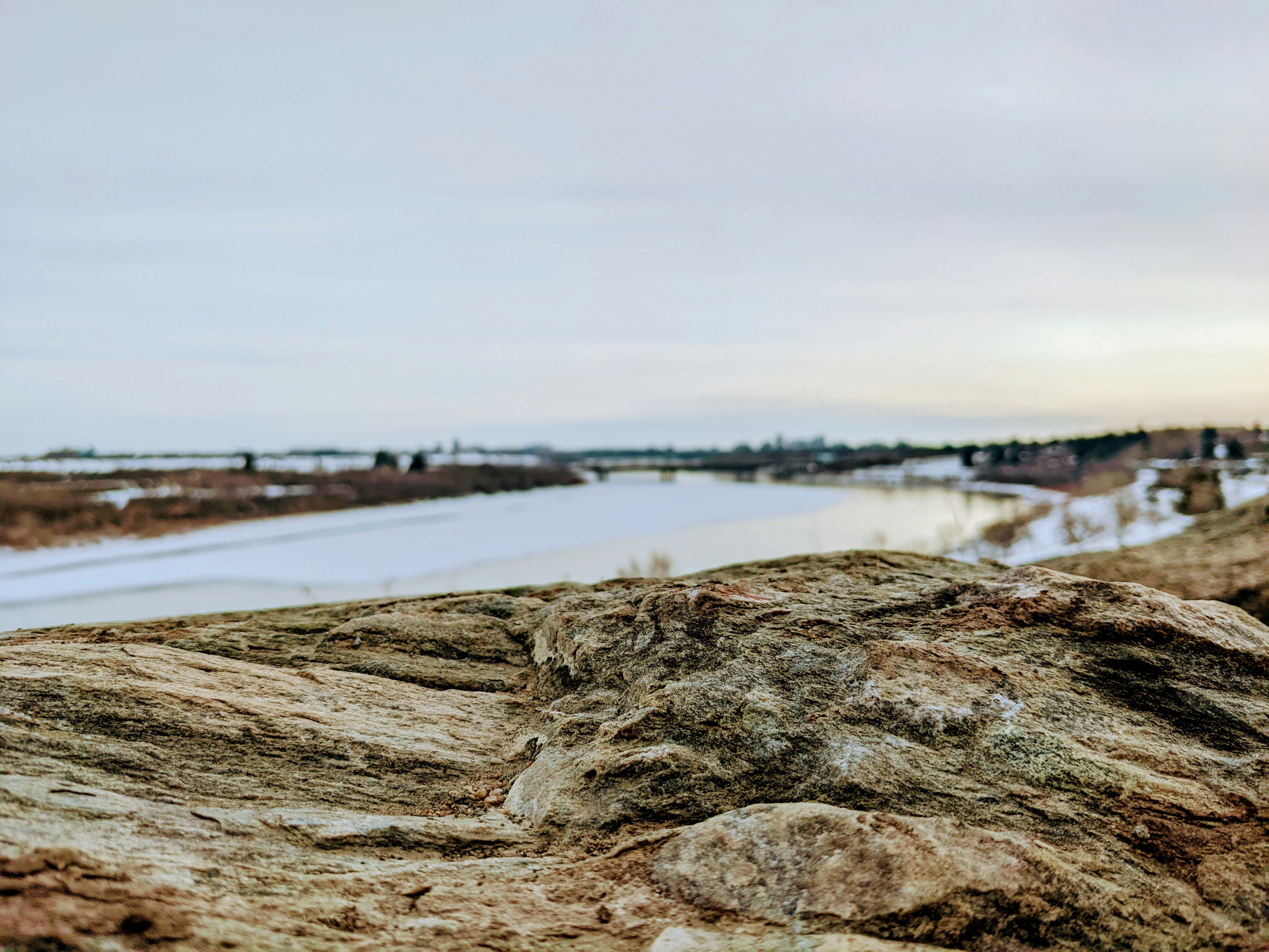 A view of a body of water from a rocky outcropping photo – Free Grey ...