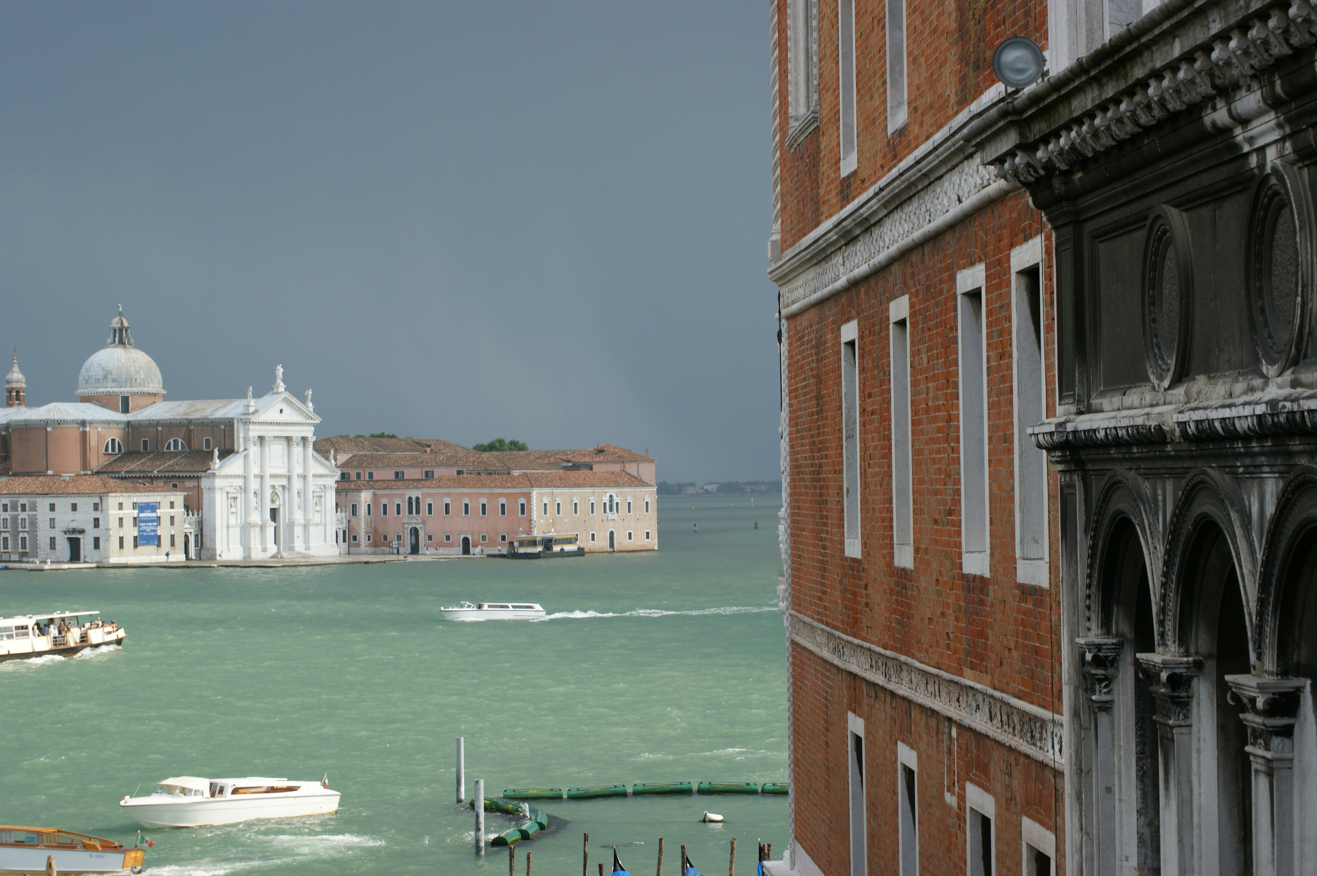 Brick Facade Framing the Lagoon: Venice's Quiet Edge