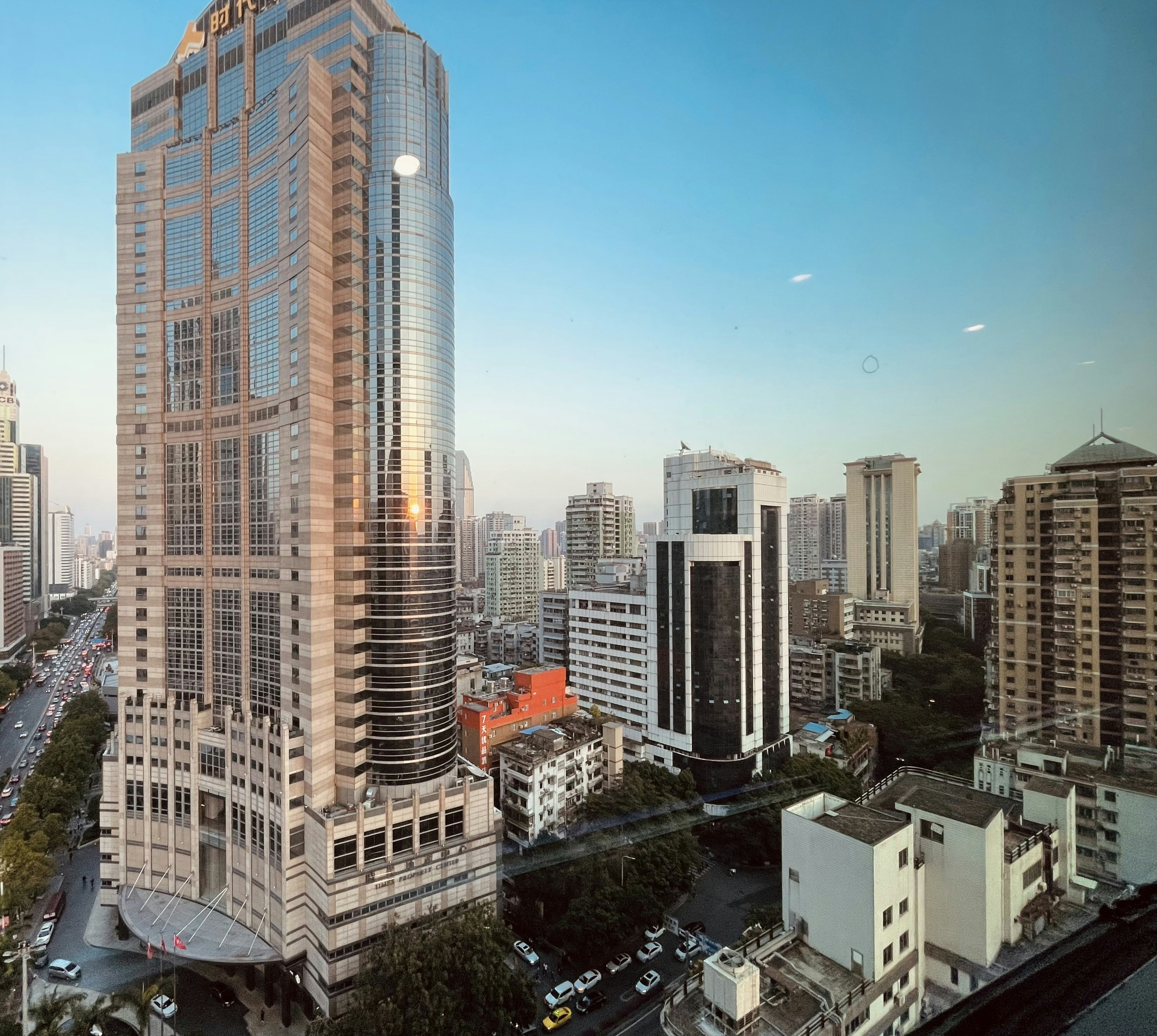 A view of a city from a high rise building photo – Free City Image on ...
