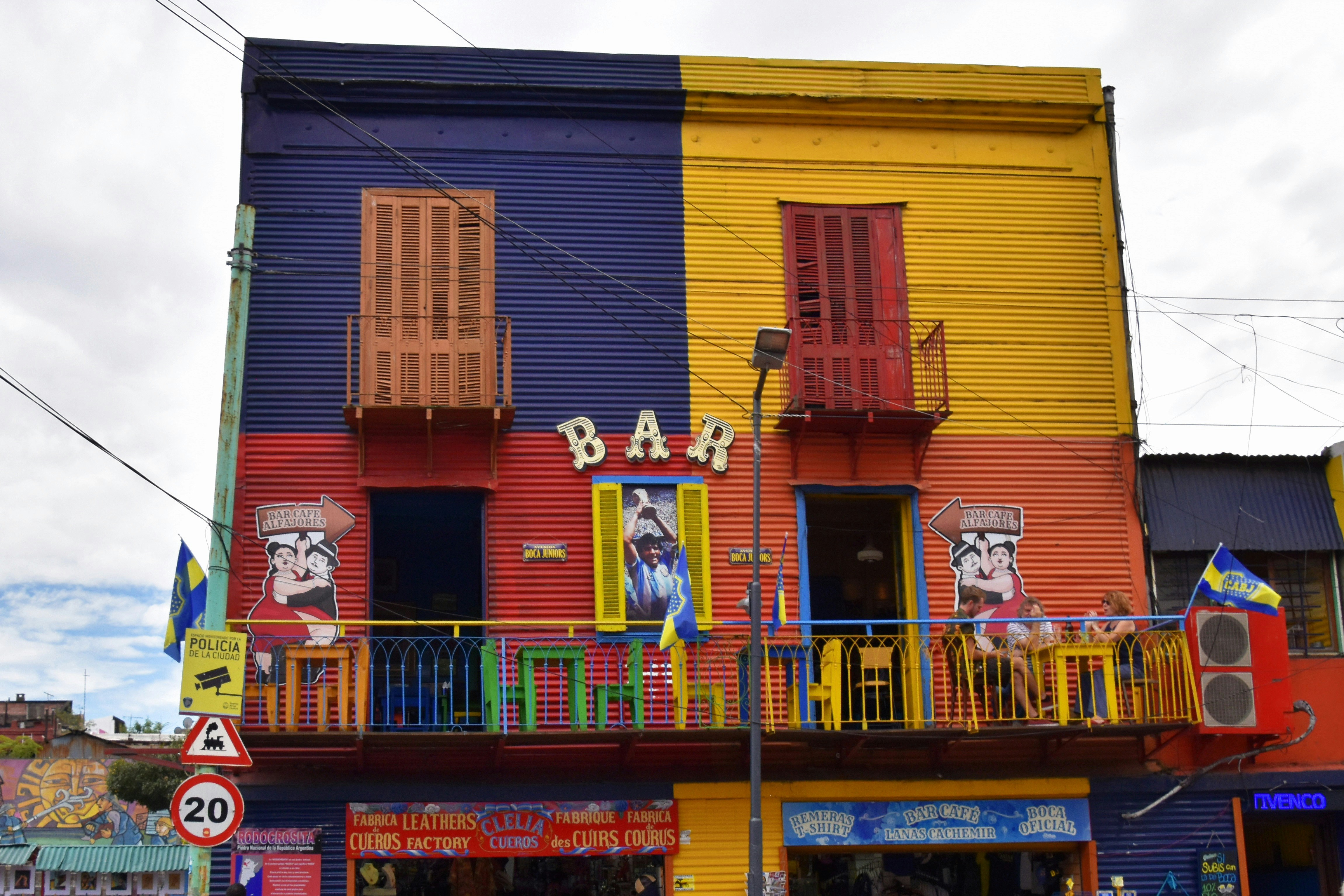 A multi - colored building with a balcony and balconies photo – Free ...