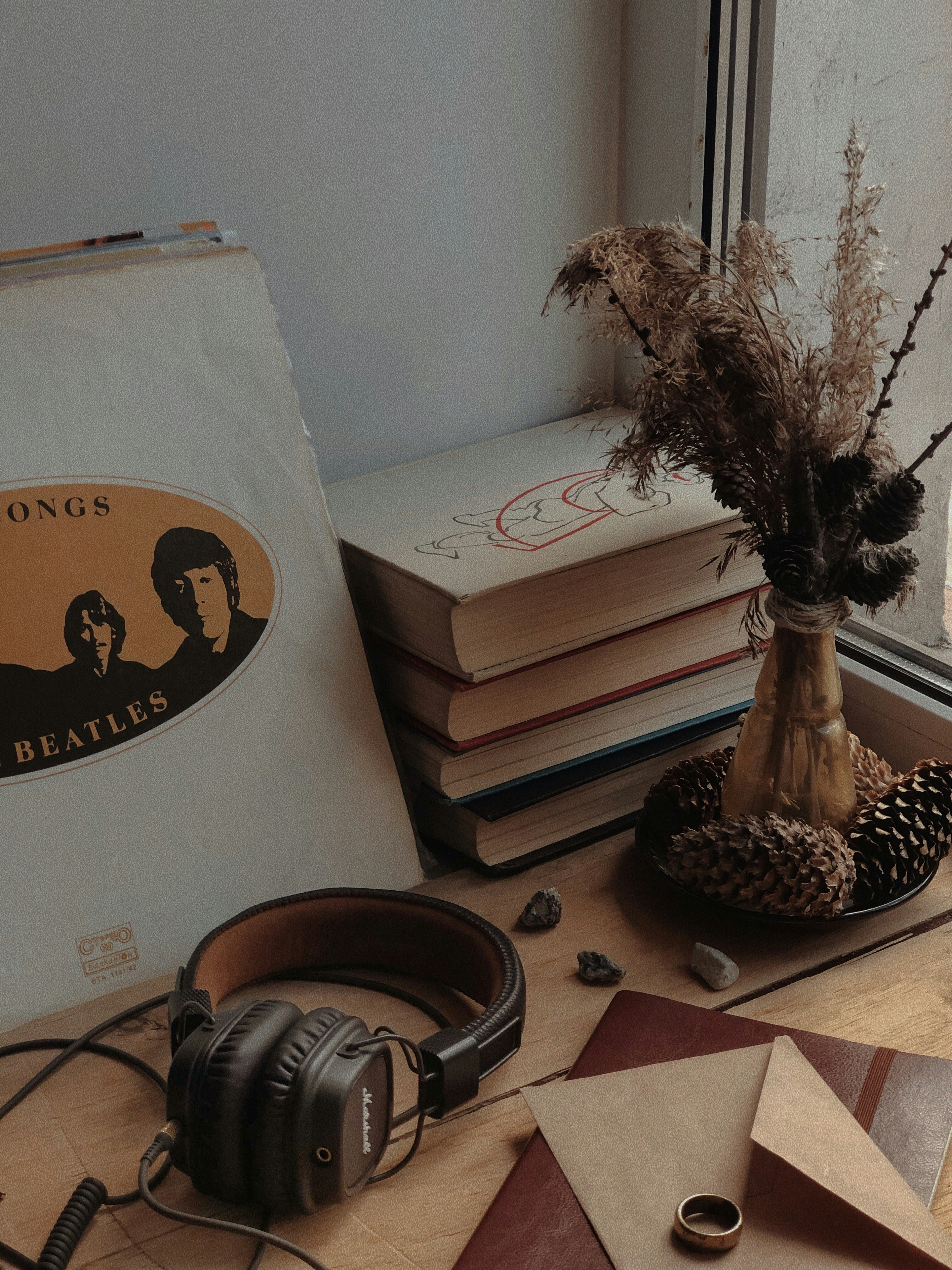 A stack of flyers on a table photo – Free Indoors Image on Unsplash