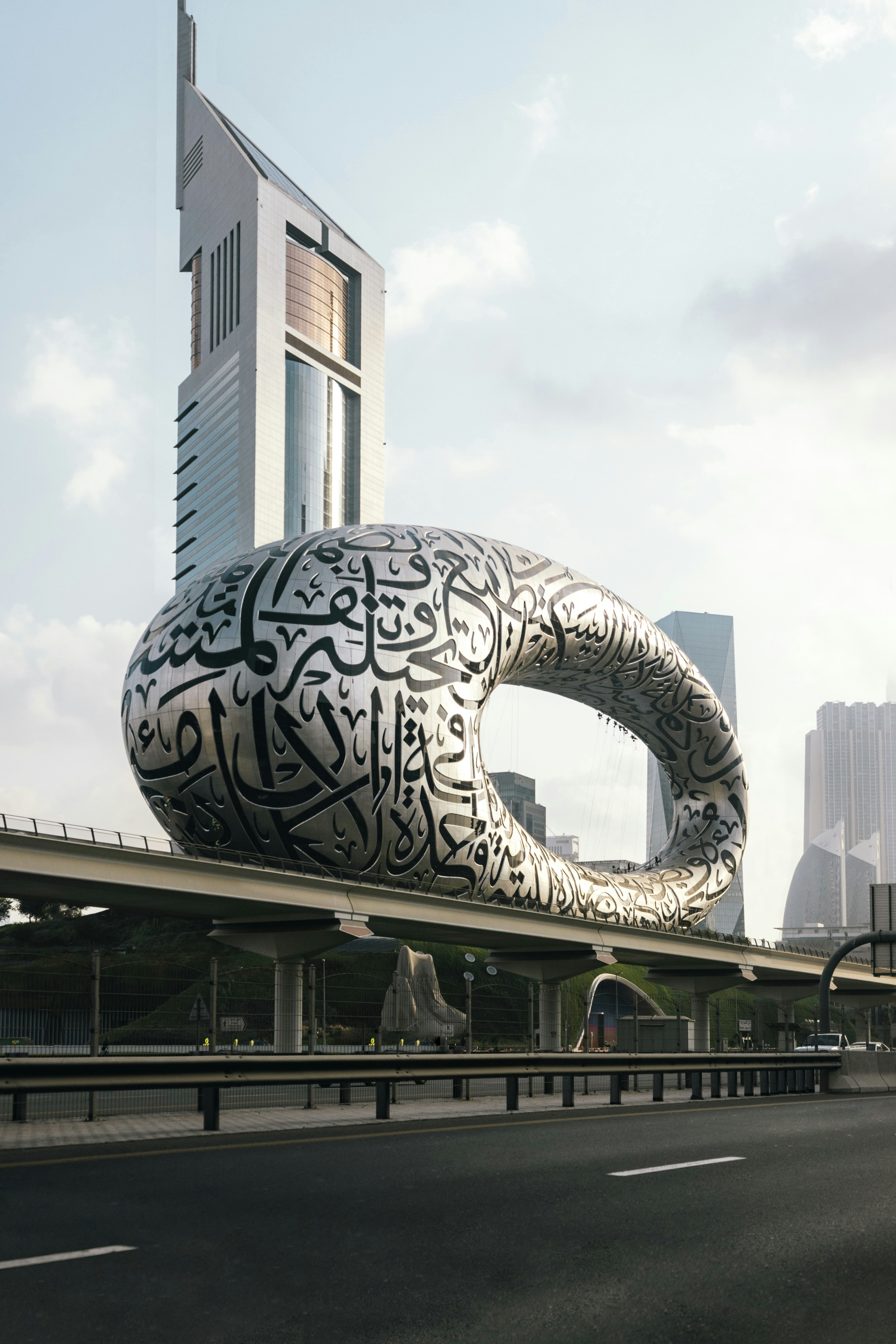 A large building with a giant snake on it's side photo – Free United ...