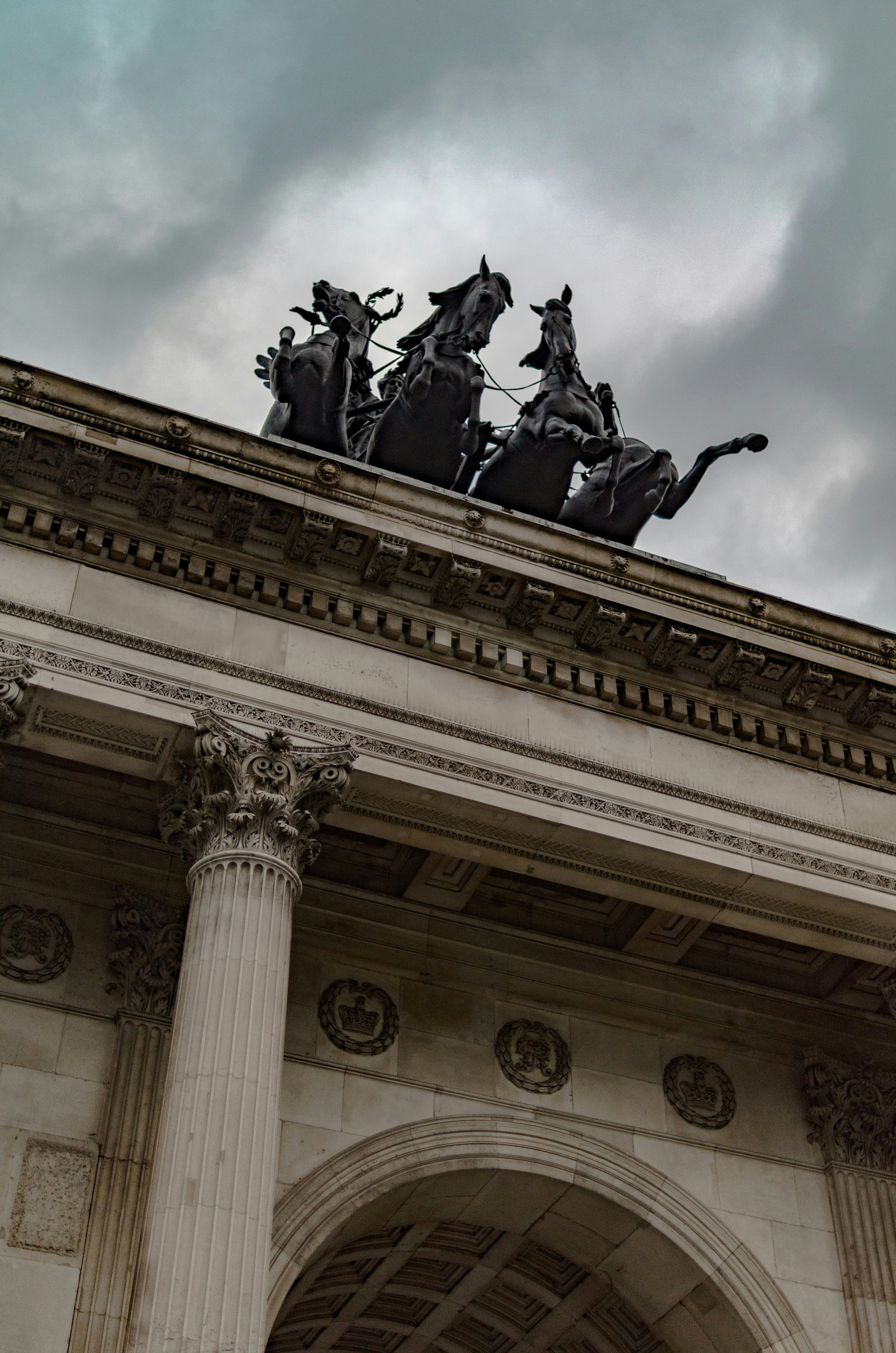 A large building with statues on top of it photo – Free London Image on ...