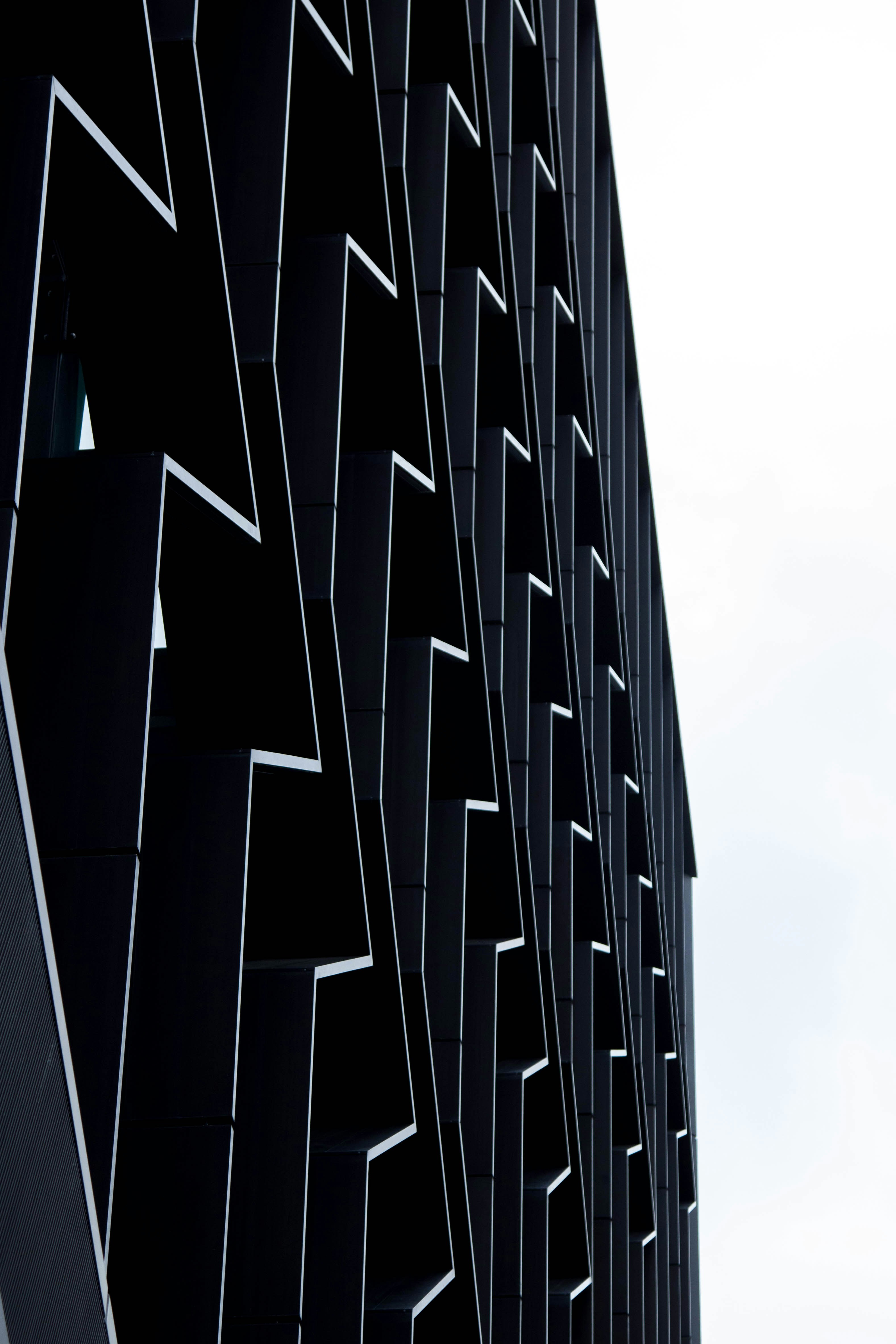 A tall black building with a clock on it's side photo – Free Auckland ...
