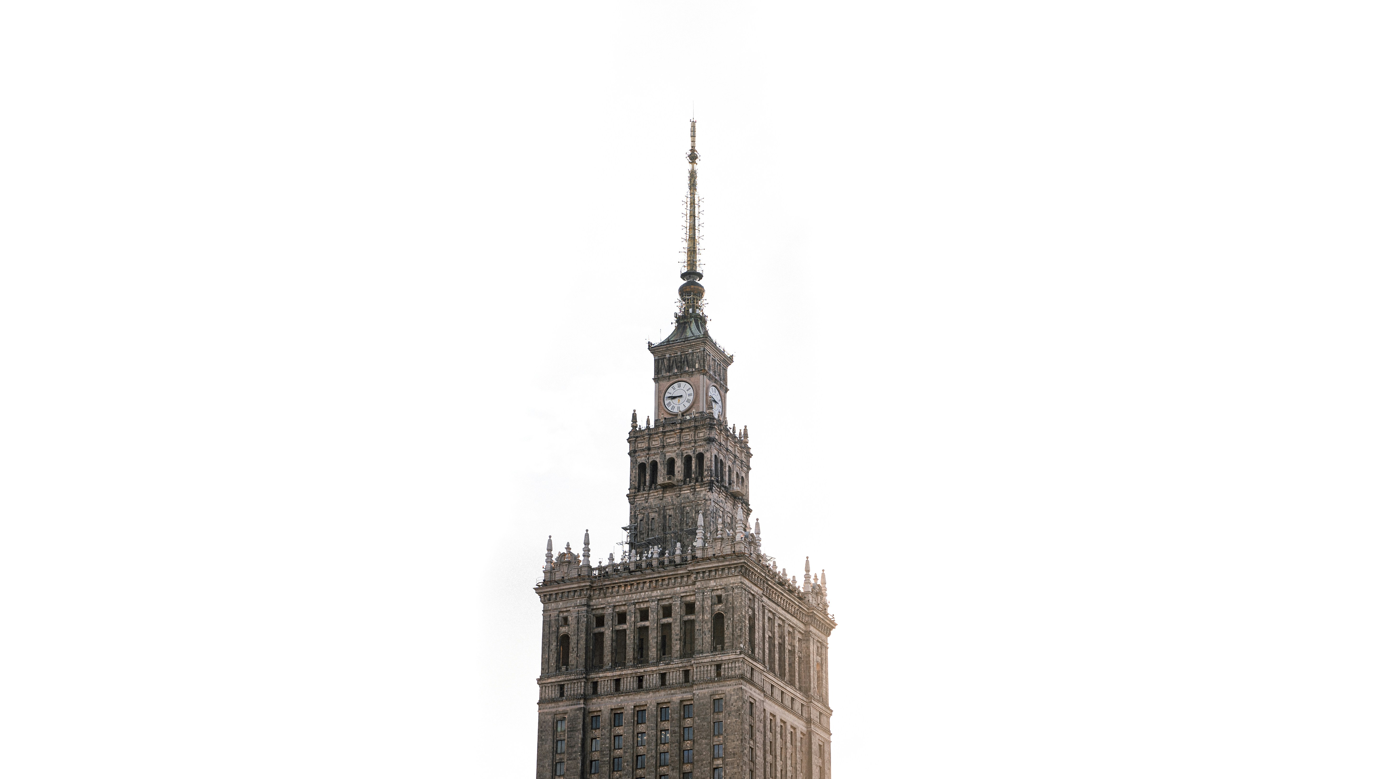 a tall building with a clock on the top of itMaksym Tymchyk 🇺🇦