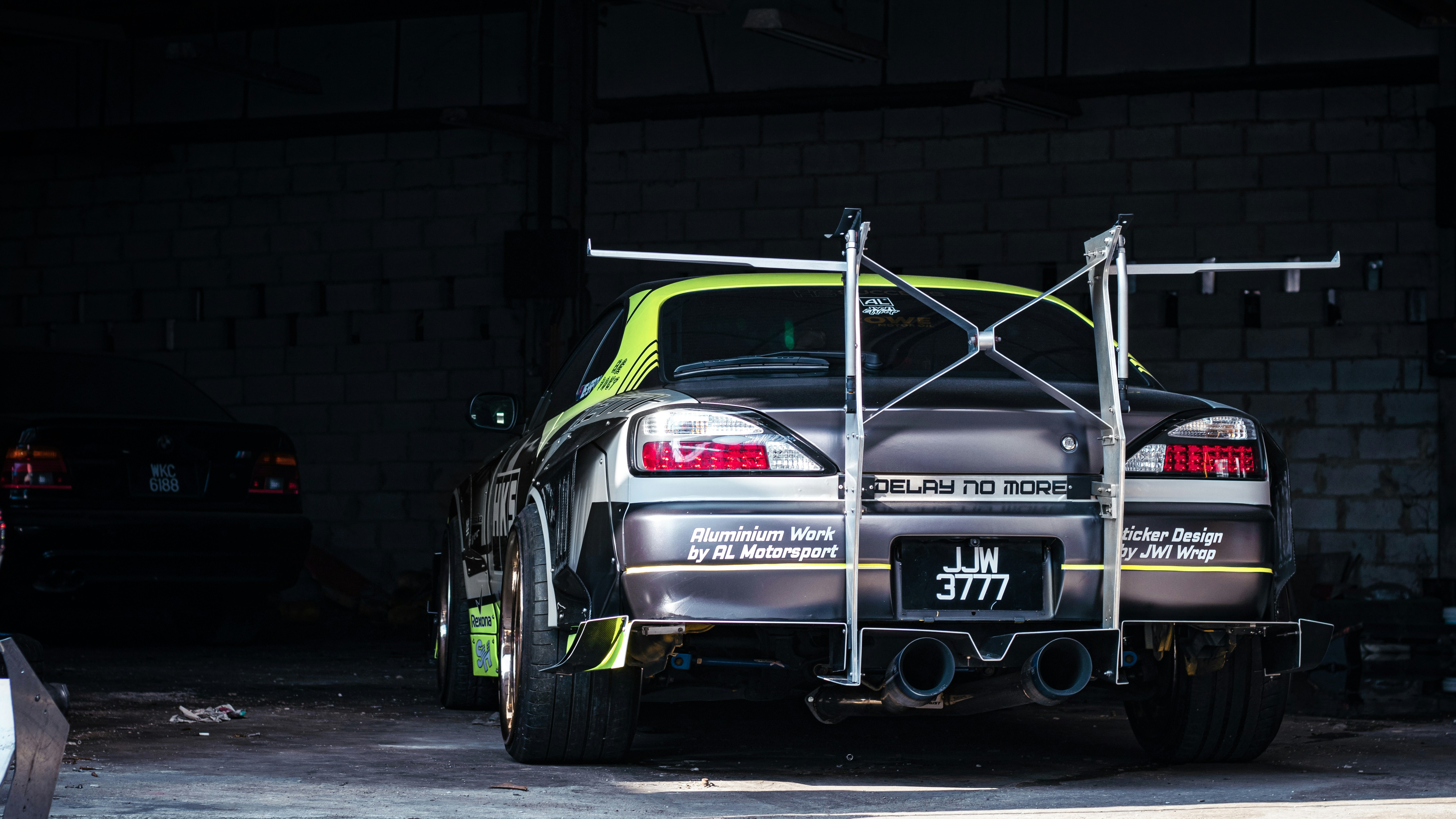 Rear-Dented Pro: Racing Drift Car in a Dim Garage