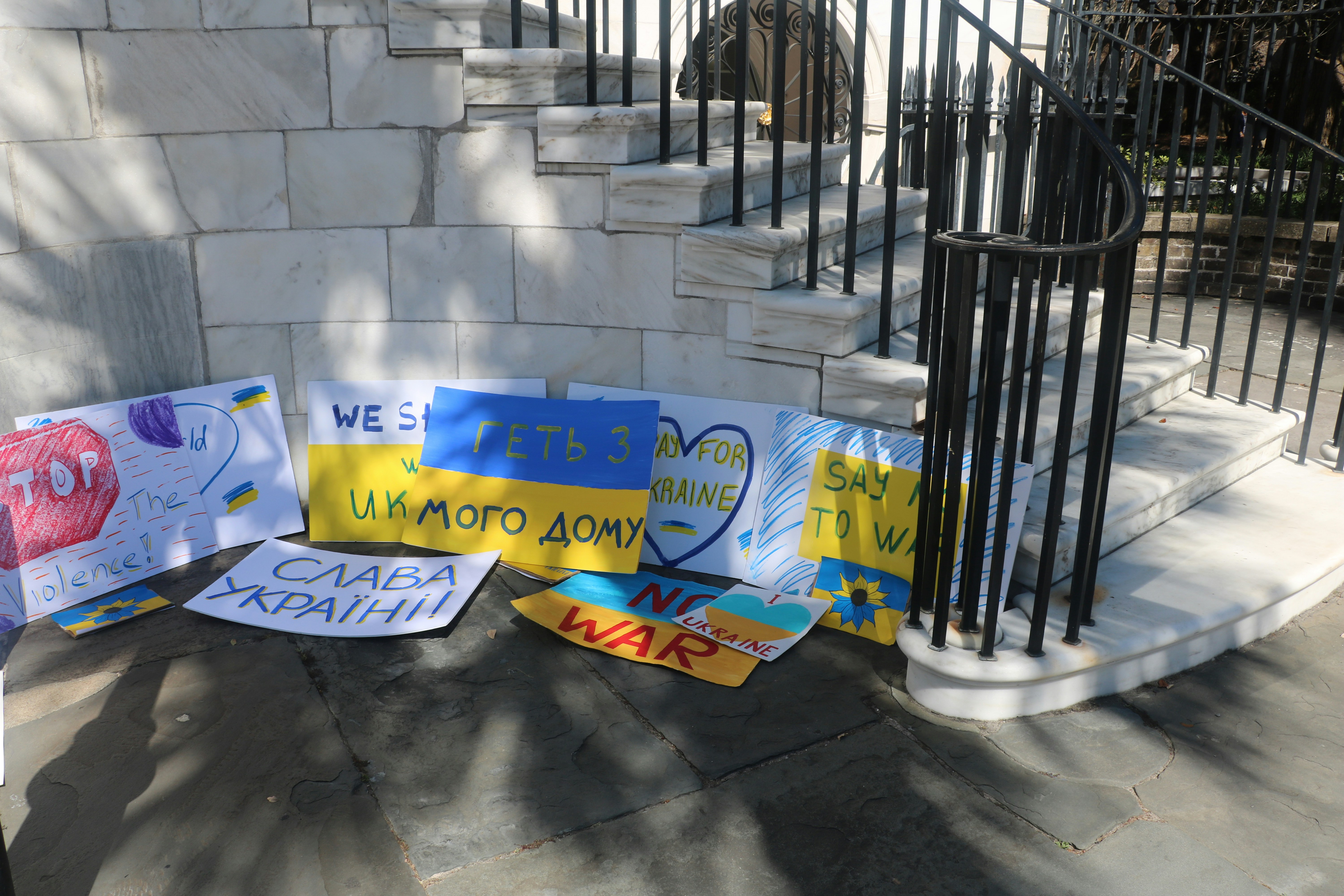 Silent Protest: Painted Messages Rest at the Stairs