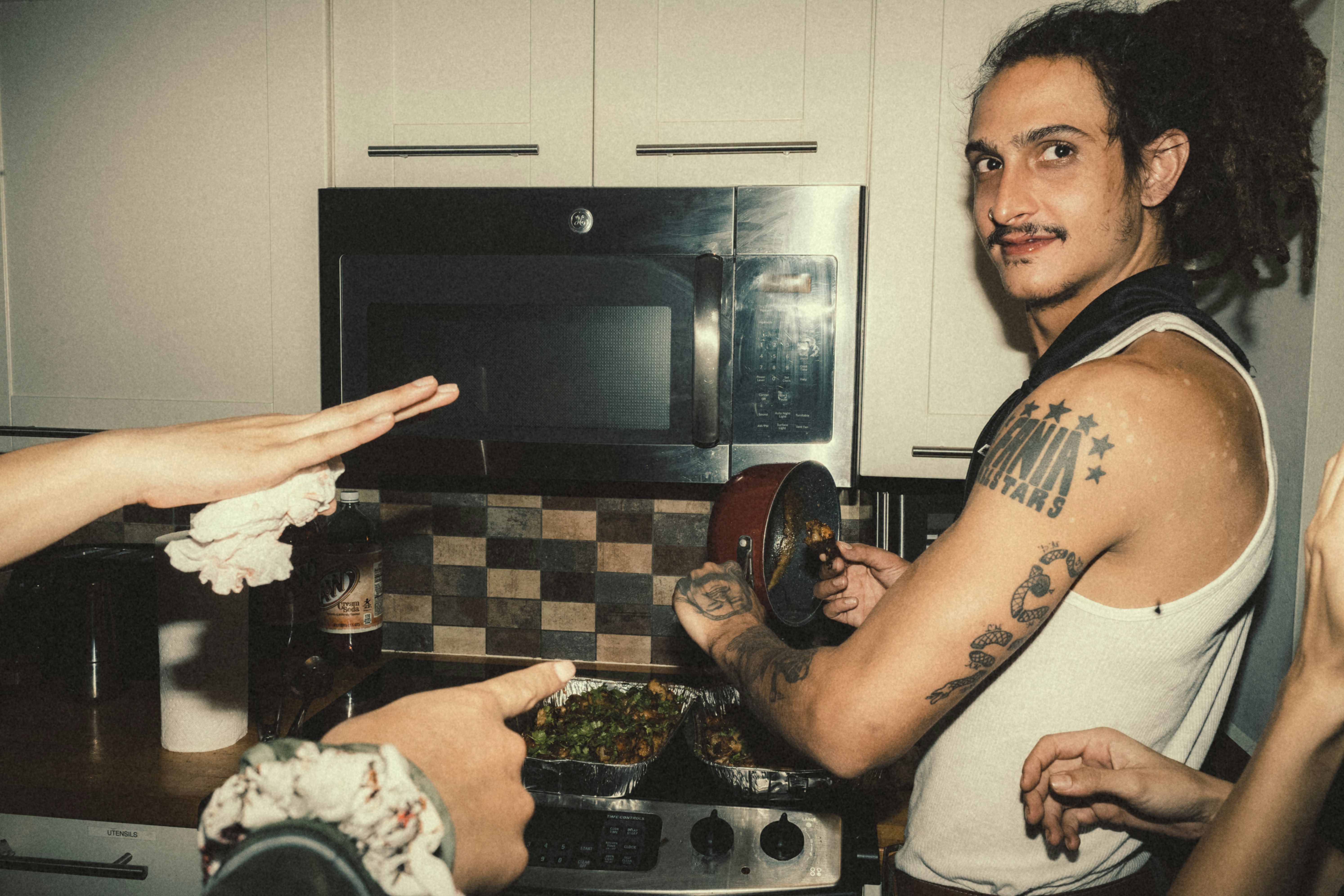 Hold and Heat: A Stove-Top Moment with a Grin