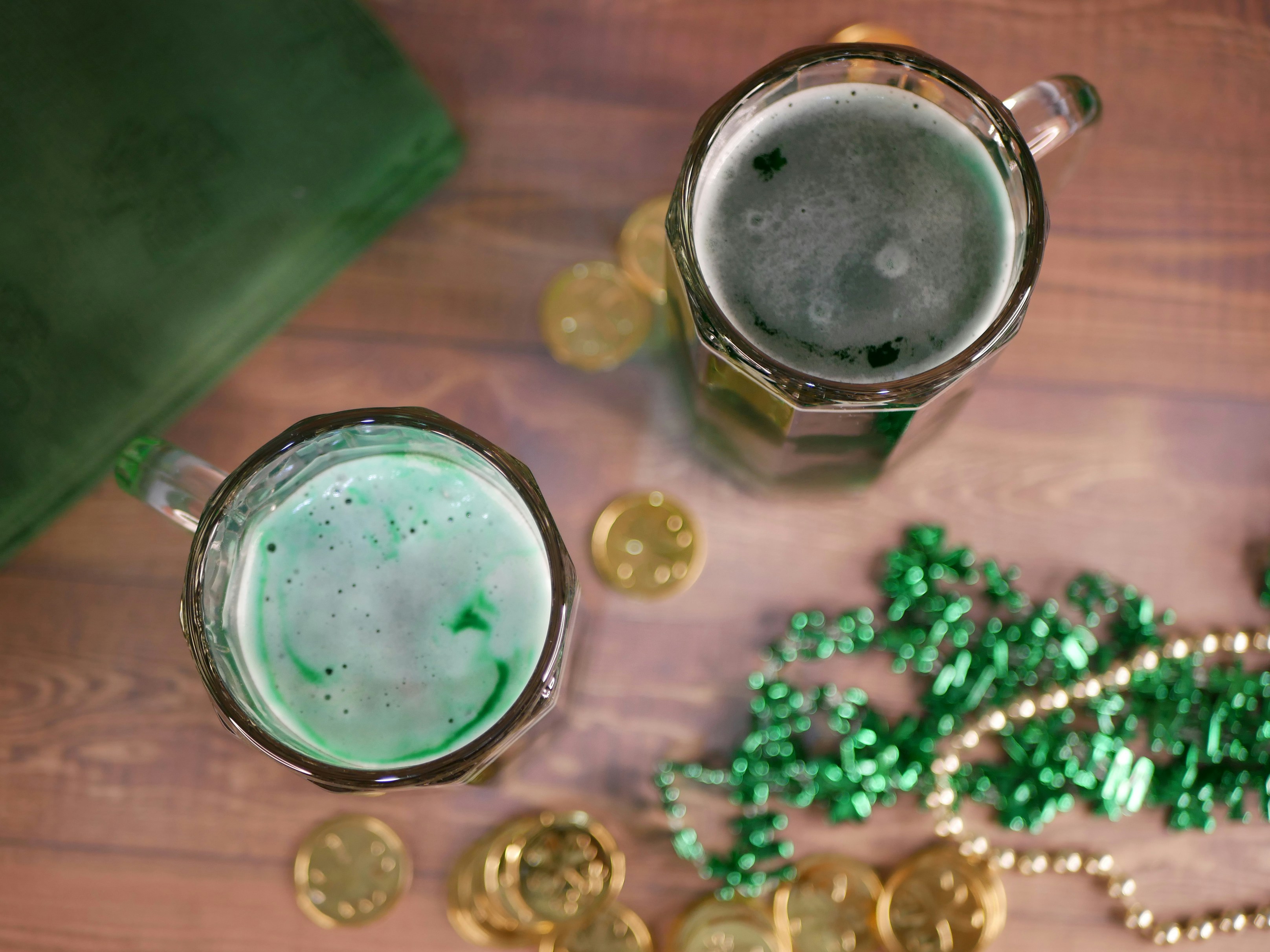 Two mugs of green liquid and gold coins photo – Free Brick Image on ...