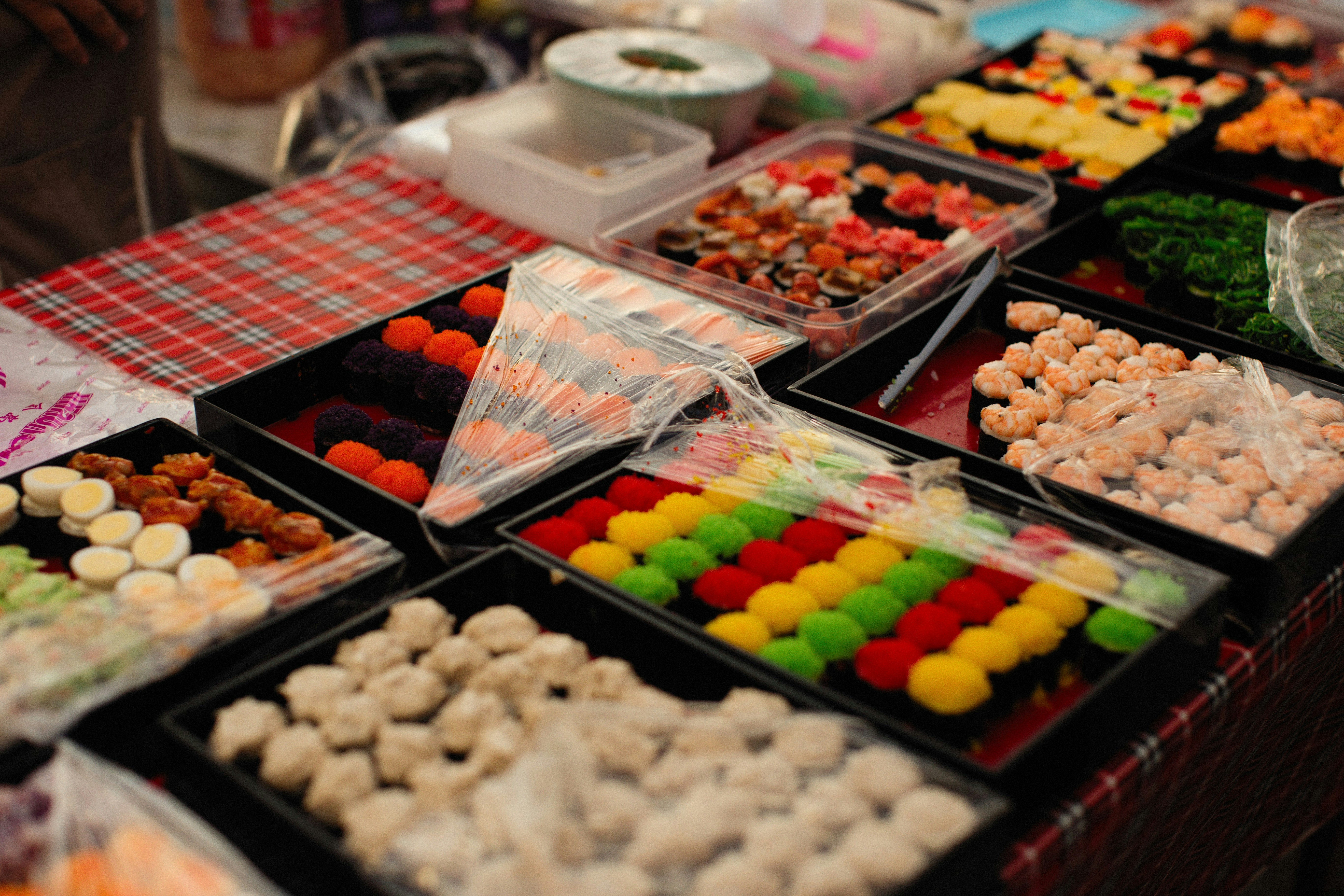 Rainbow Confections Array on a Checkered Market Table