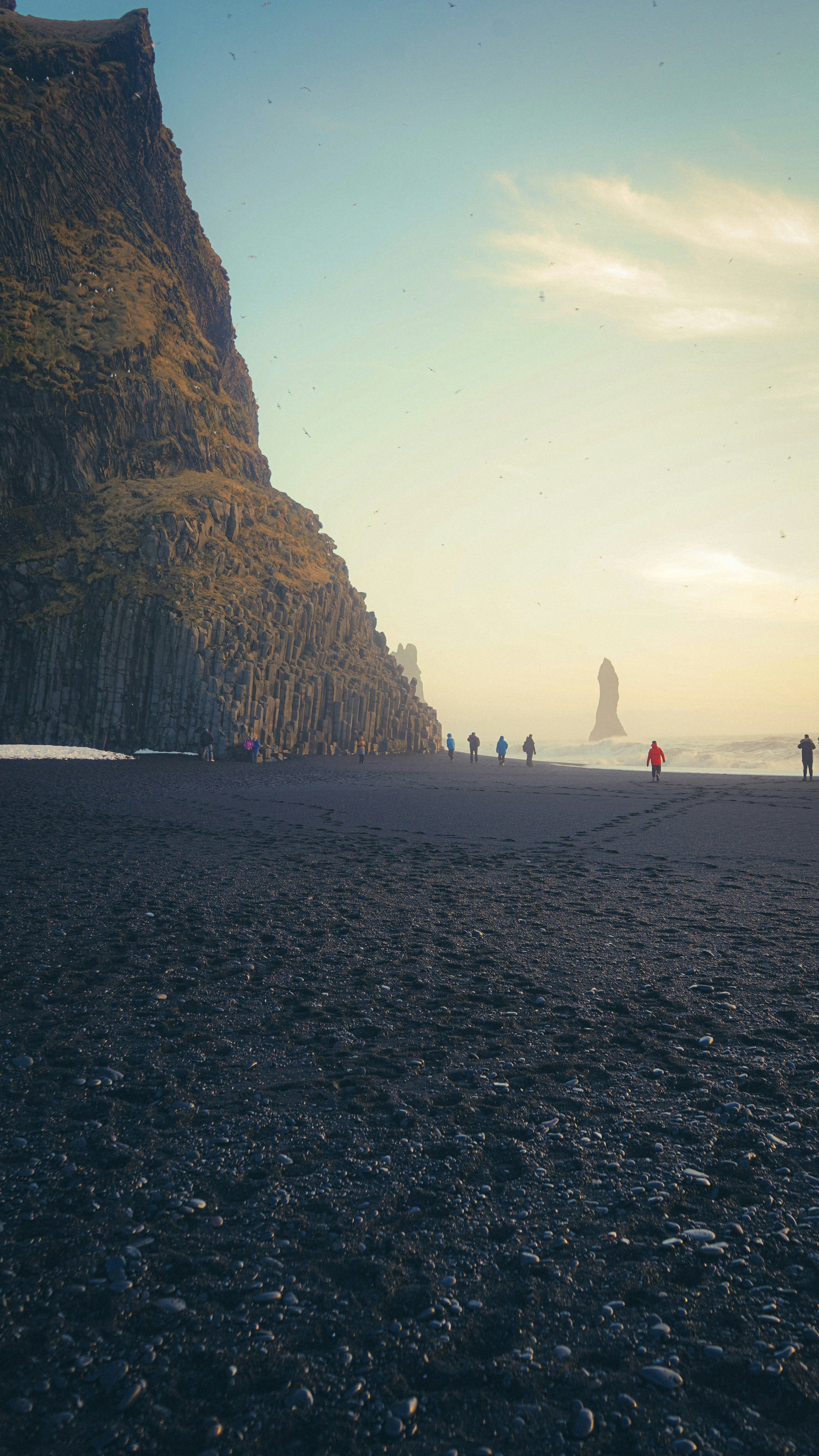Basalt Cathedral at Dusk: A Black-Sand Beach with Distant Sea Stack