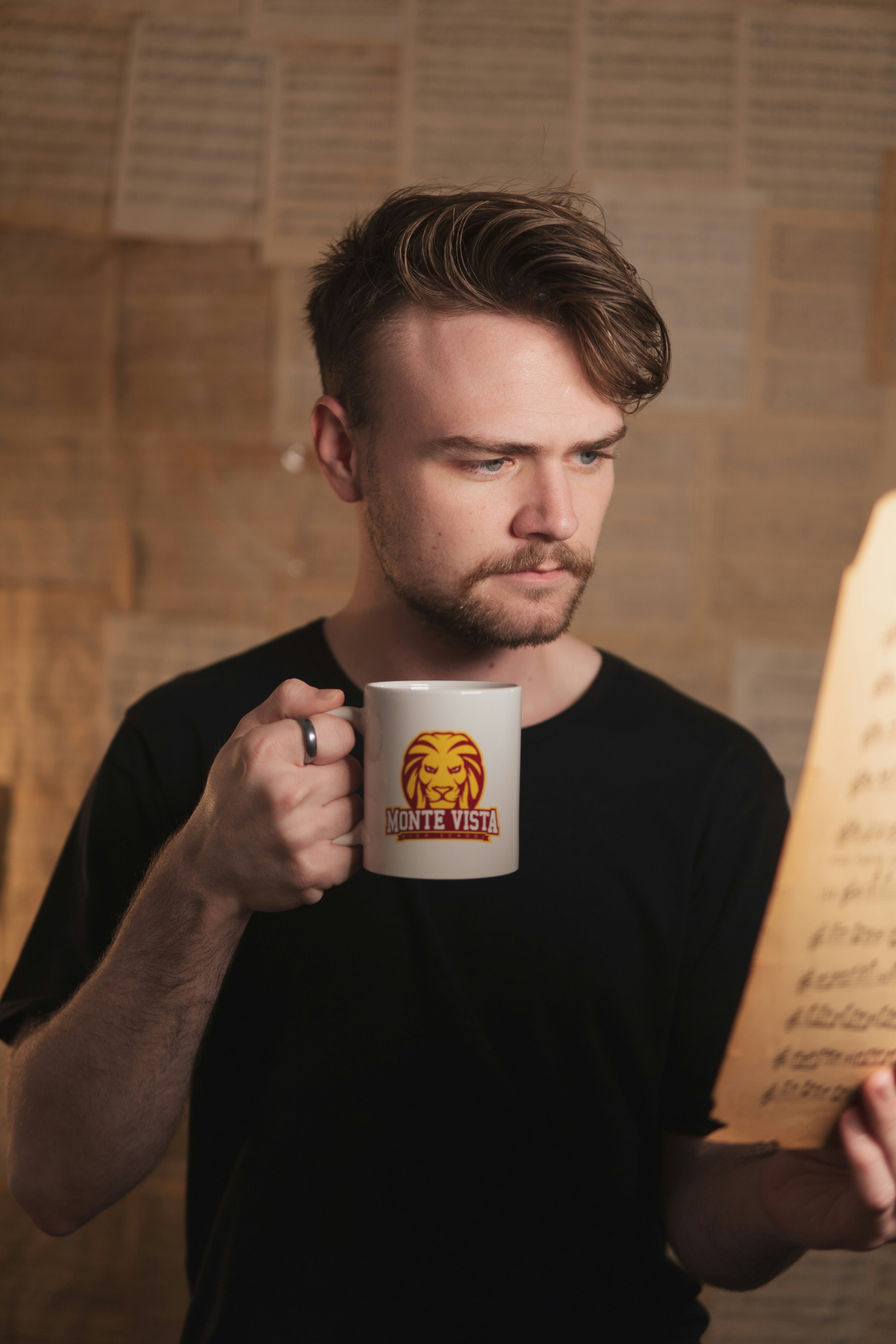 Monte Vista Moment: Quiet Focus with a Mug and Script in Warm Studio Light