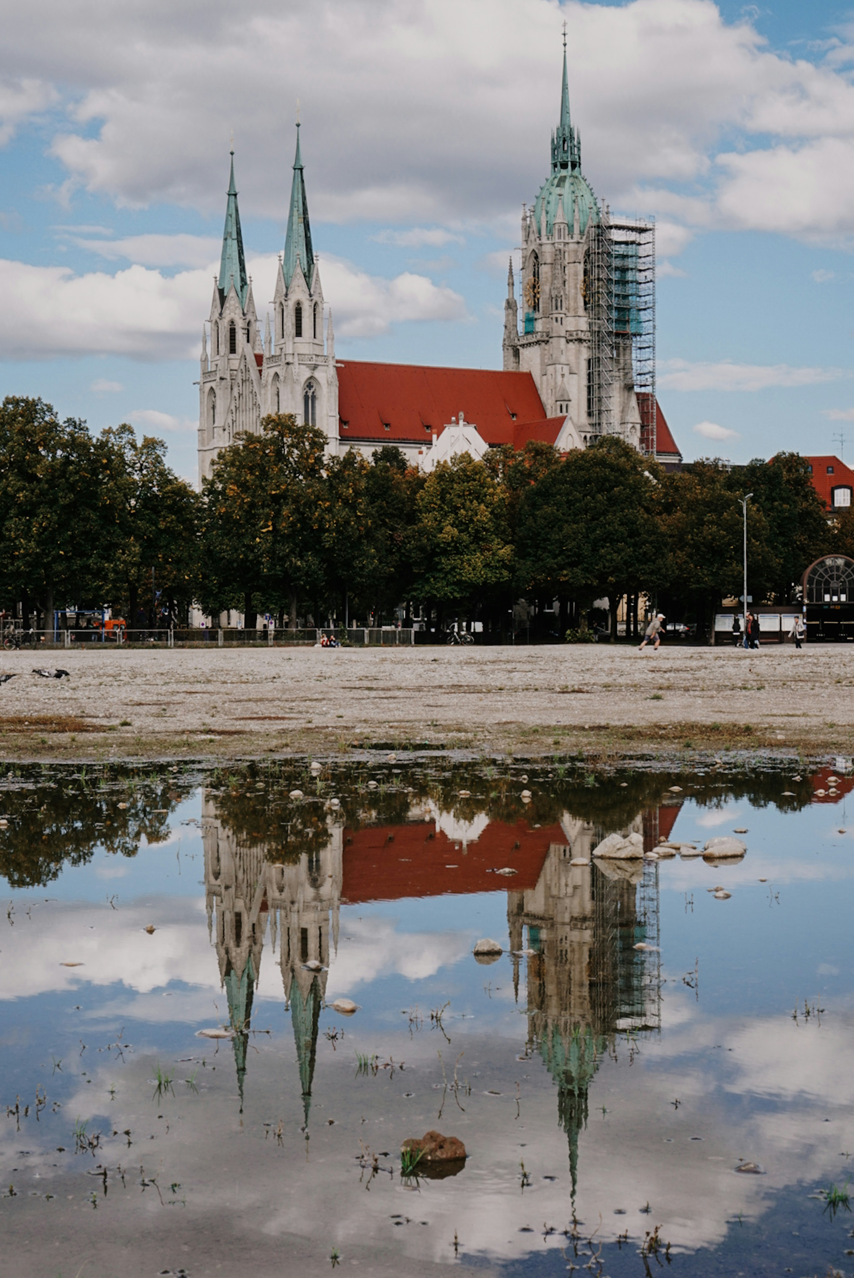 A large cathedral with a red roof and spires photo – Free Germany Image ...