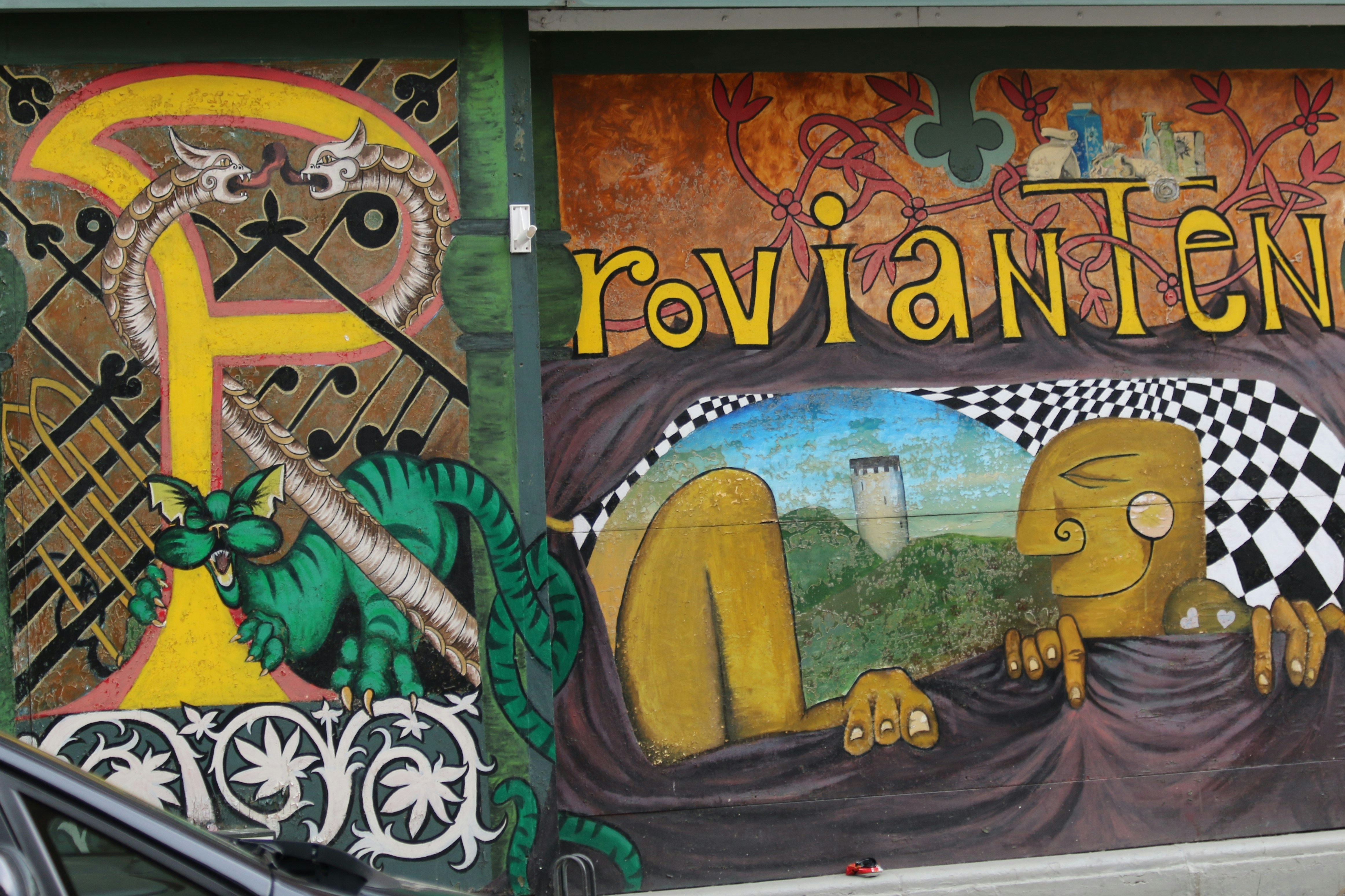 Reclining in Checkerboard Dreams: A Surreal Muralscape on a City Wall