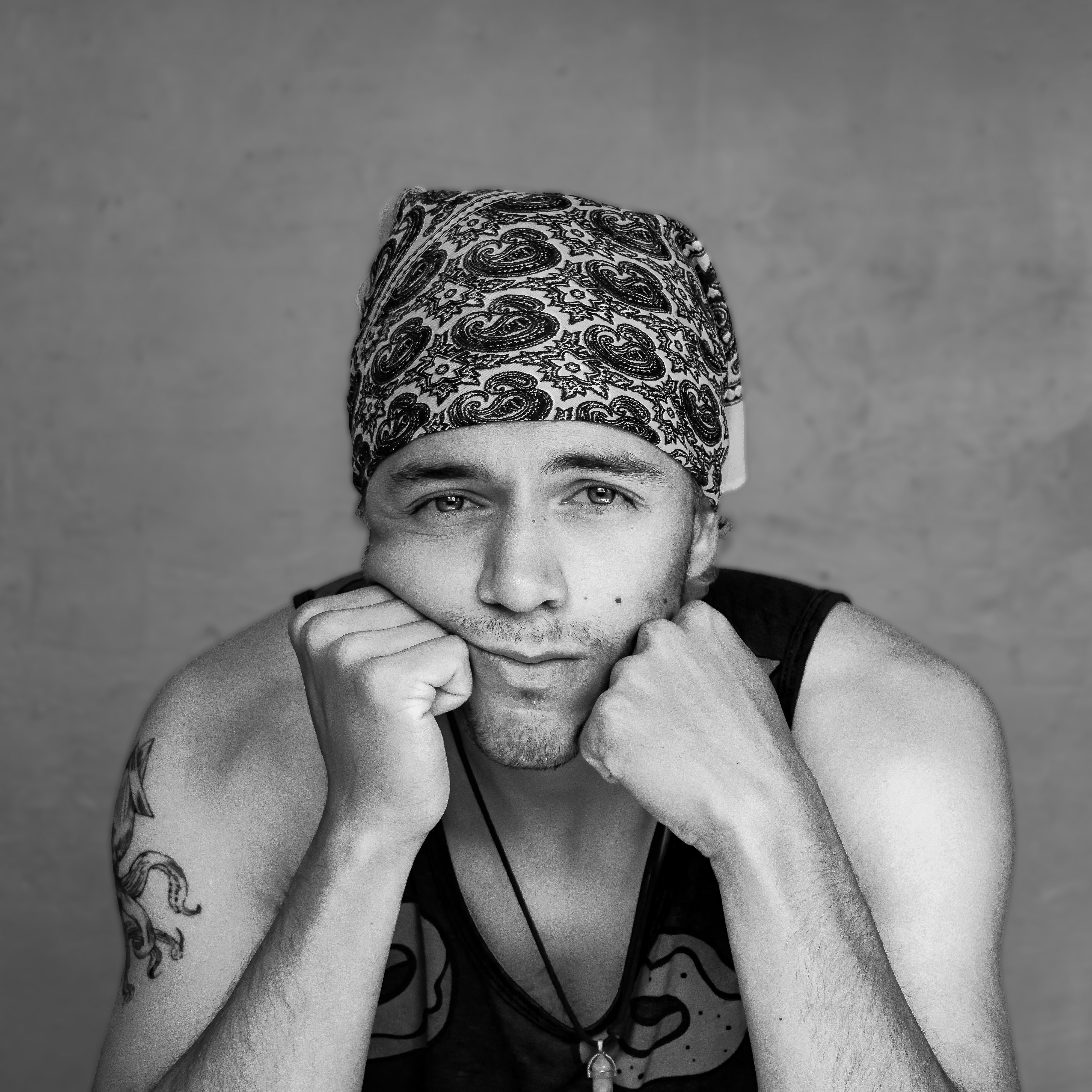 Bandana and Gaze: A monochrome portrait of quiet intensity