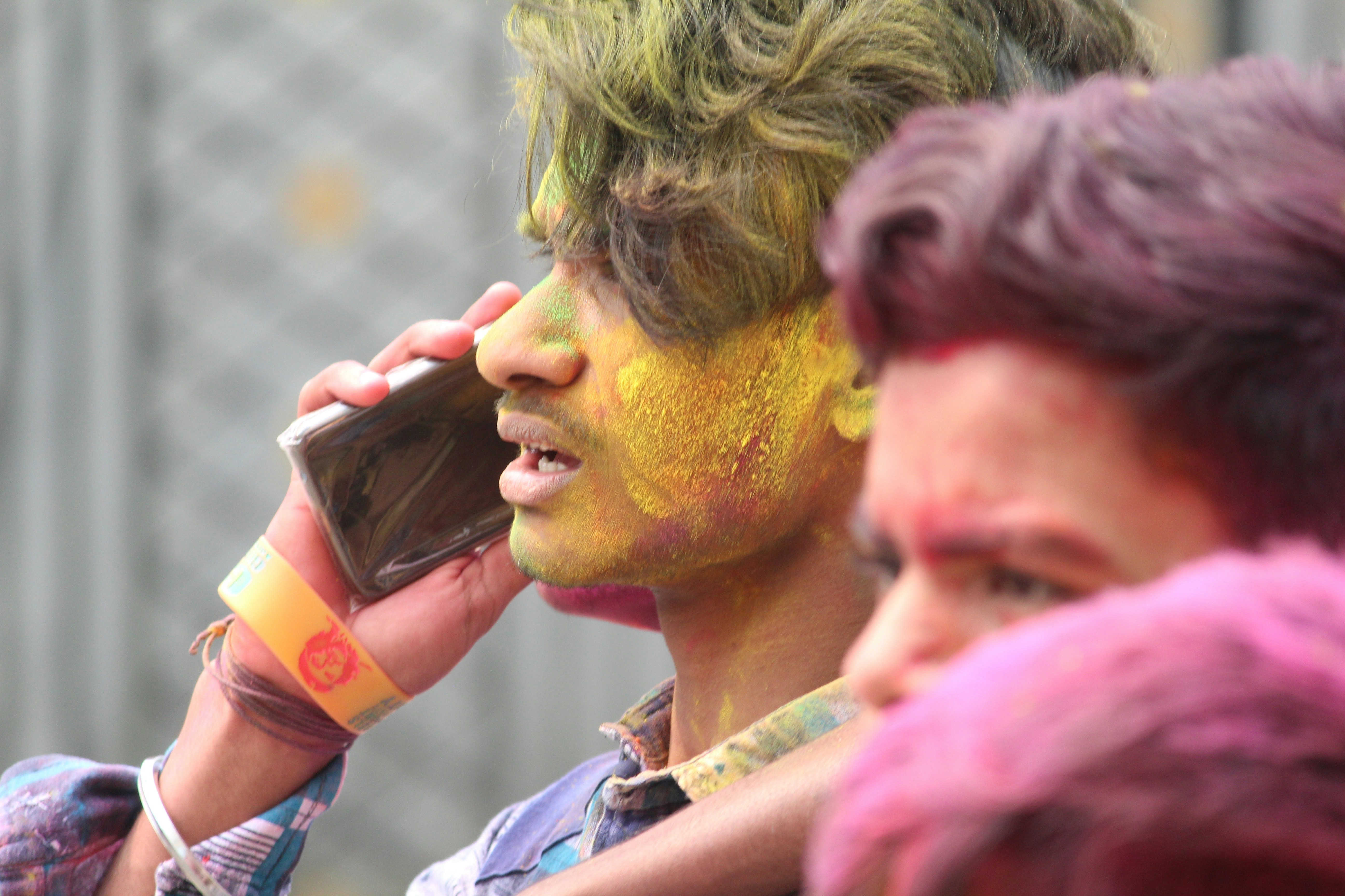 Holi Pulse: A Phone Call Among Powdered Faces