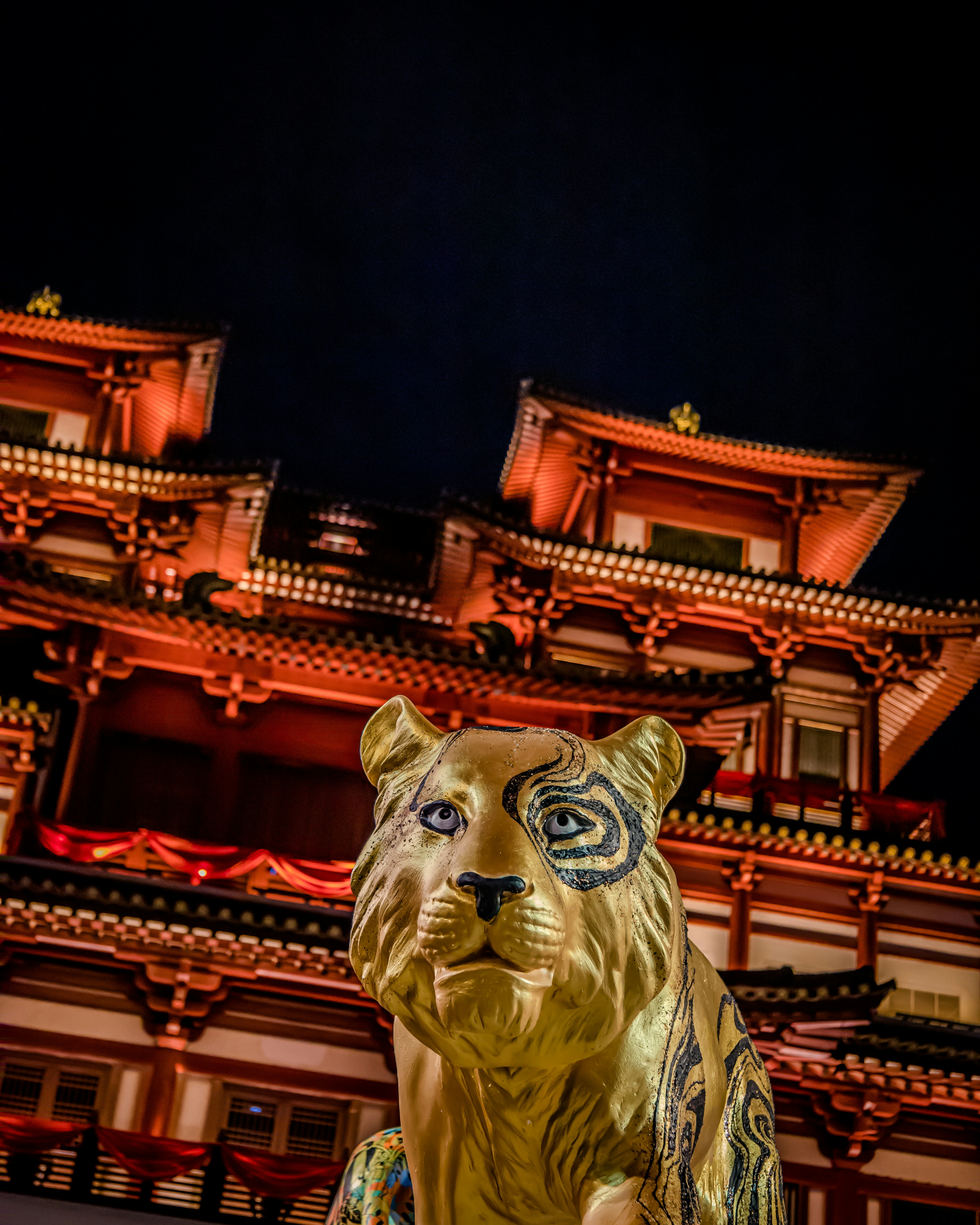 A statue of a bear in front of a building photo – Free Temple Image on ...