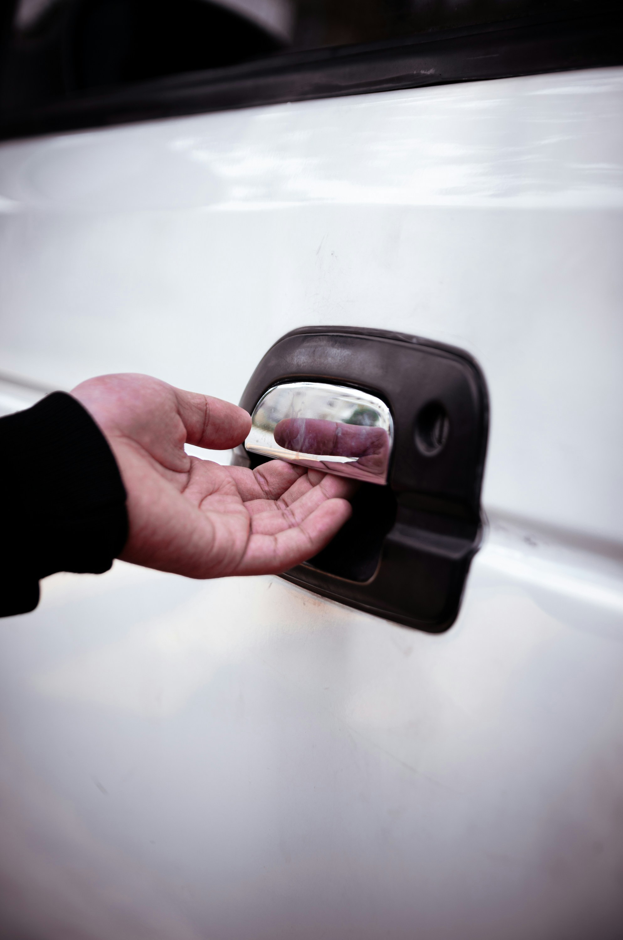 Reflection in a Car Handle: The Moment of Access