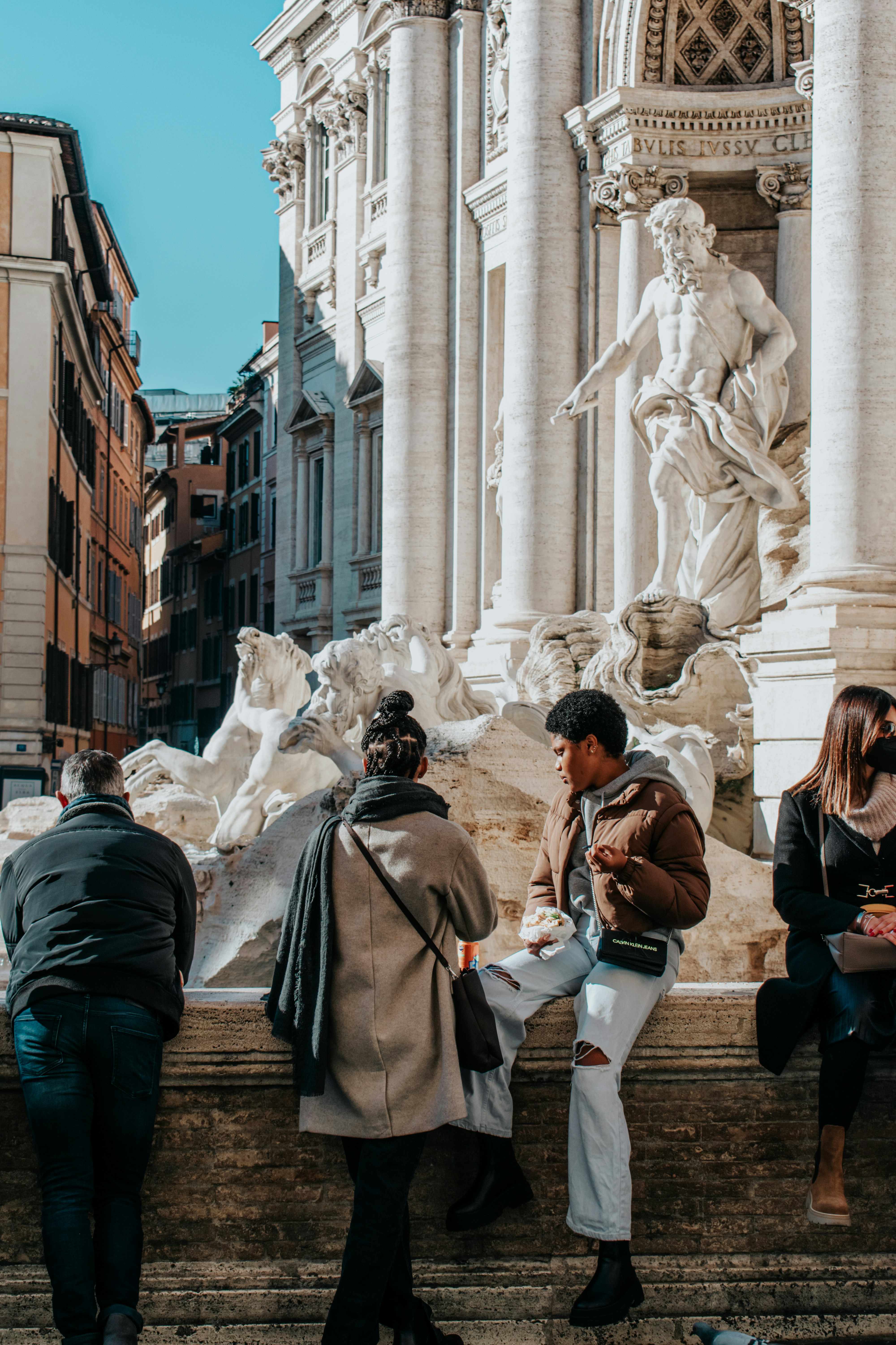 Chatting by the Fountain: Street Life at a Marble Landmark