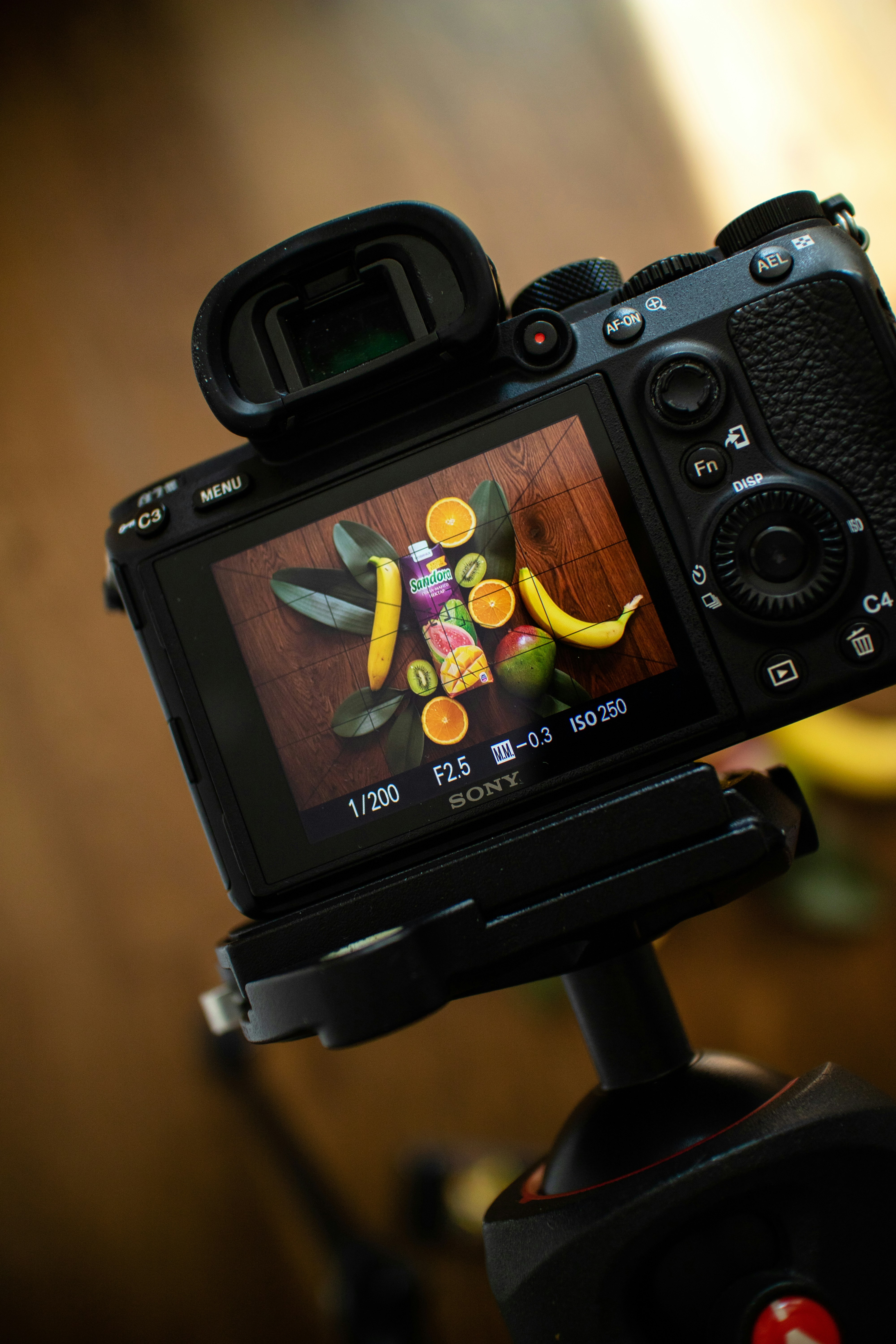 Fruit on the LCD: Studio Still-Life Framed by a Tripod Rig