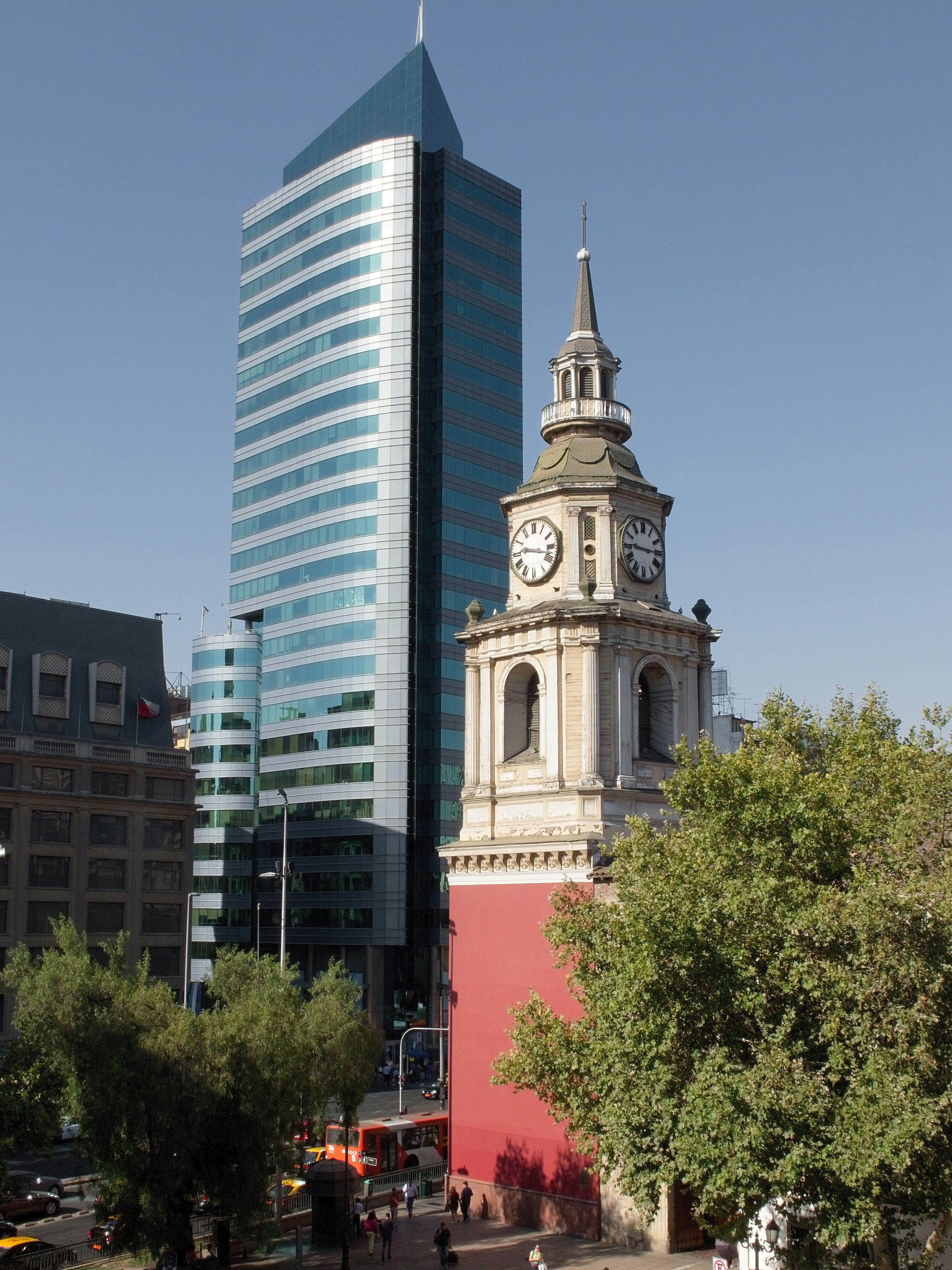 A clock tower in the middle of a city photo – Free Architecture Image ...