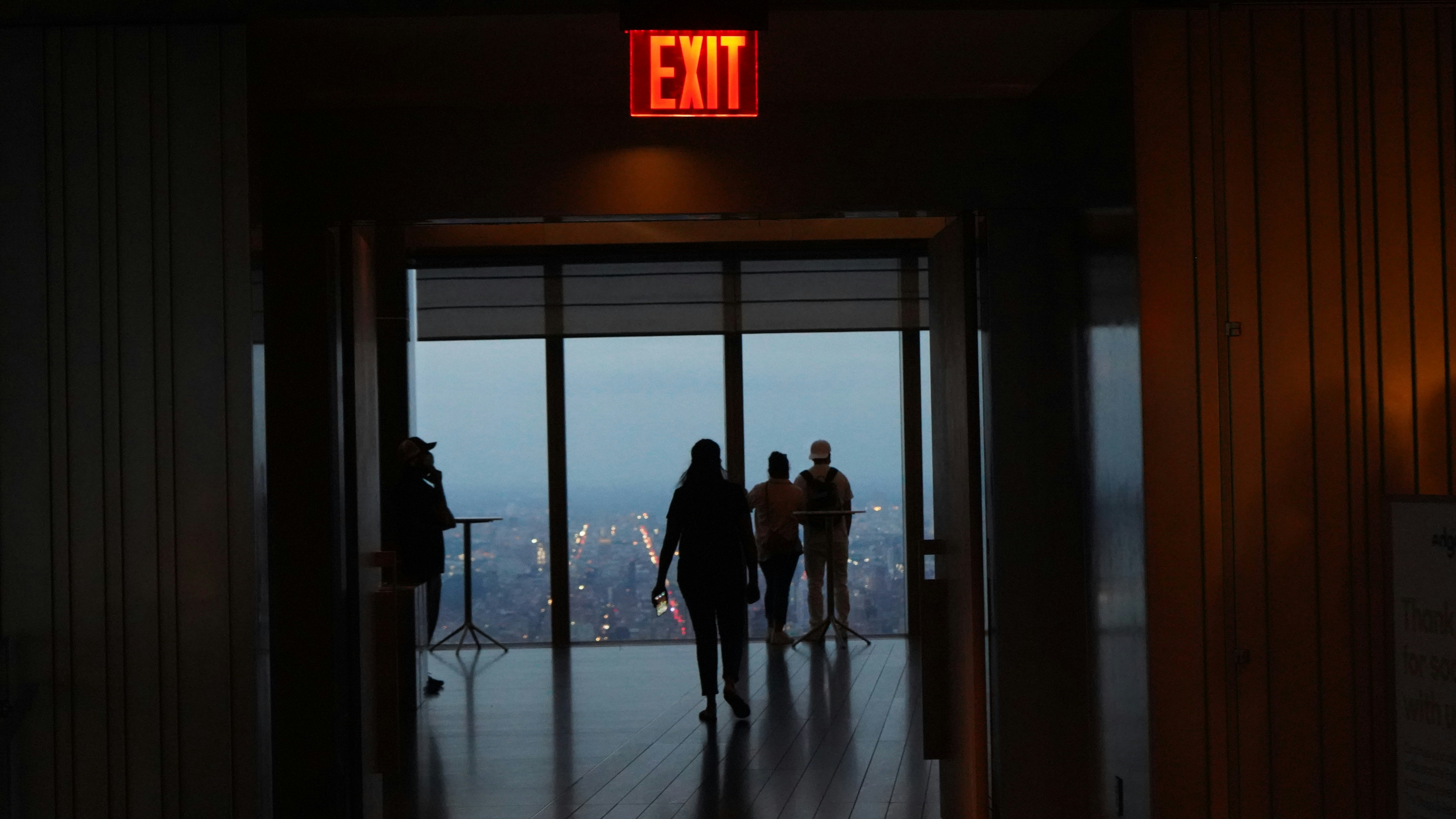 A group of people walking into a building photo – Free New york Image ...