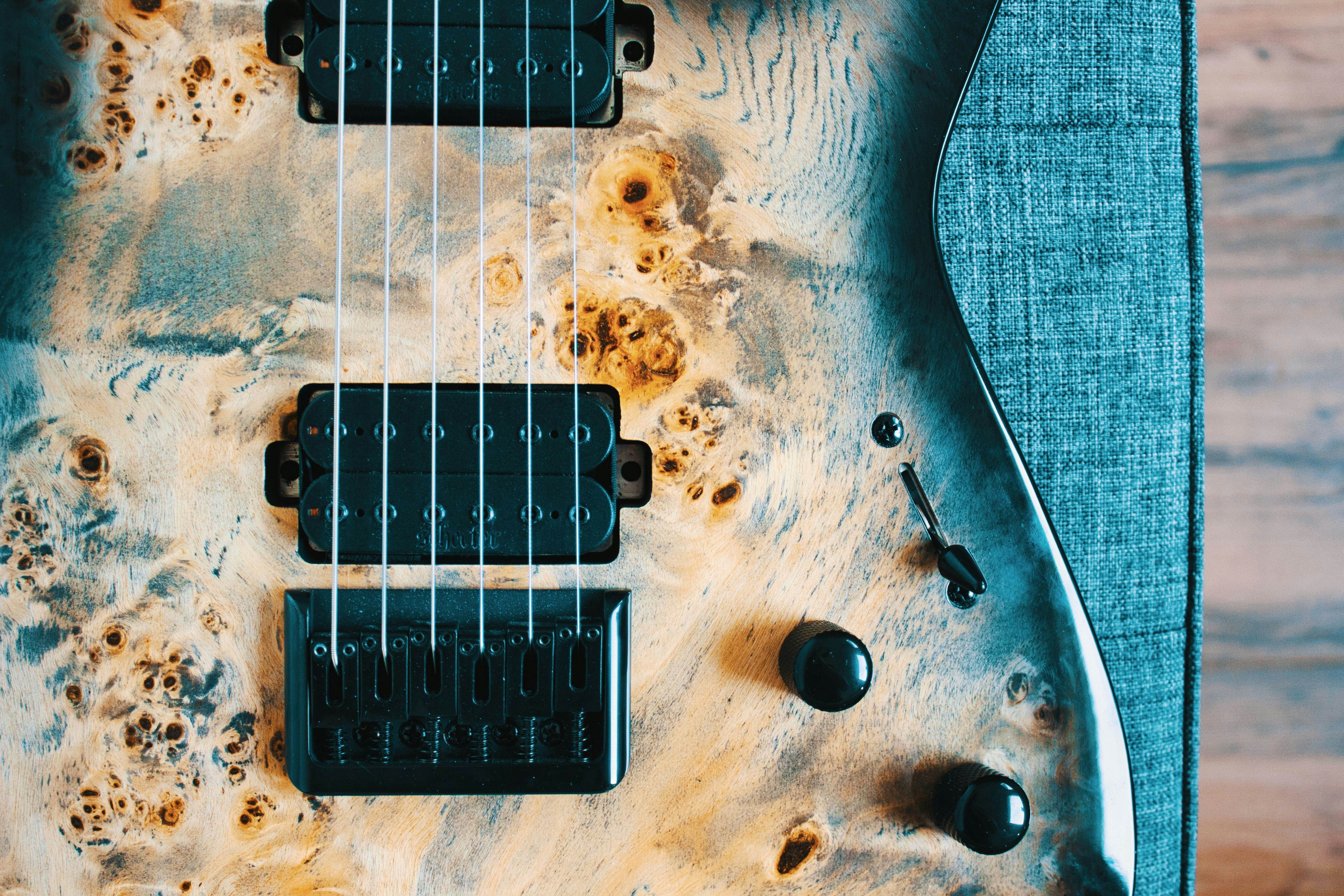 A close up of a guitar with a lot of rust on it photo – Free Guitar ...