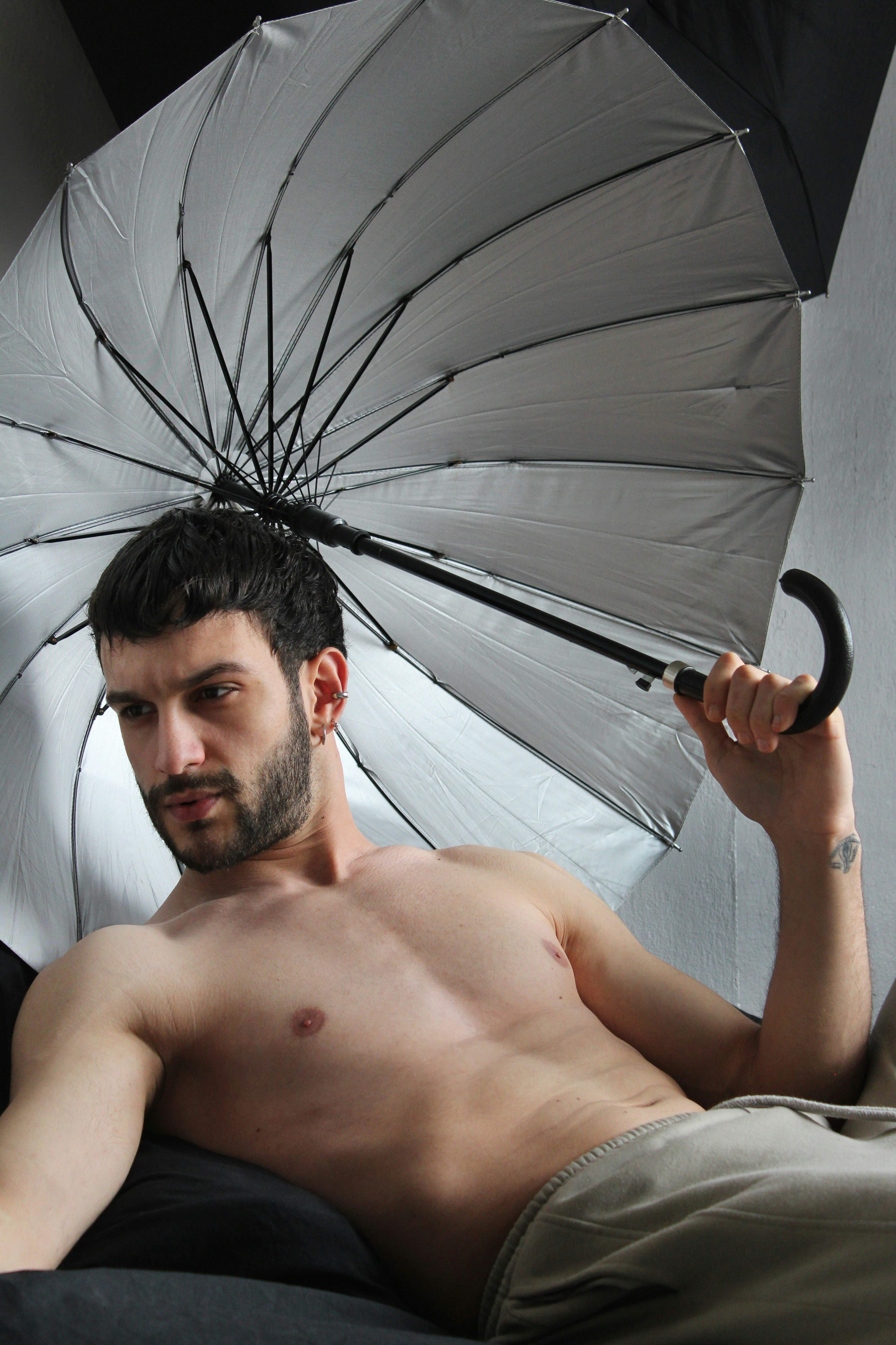 Under the Studio Umbrella: A Quiet Portrait in Diffused Light