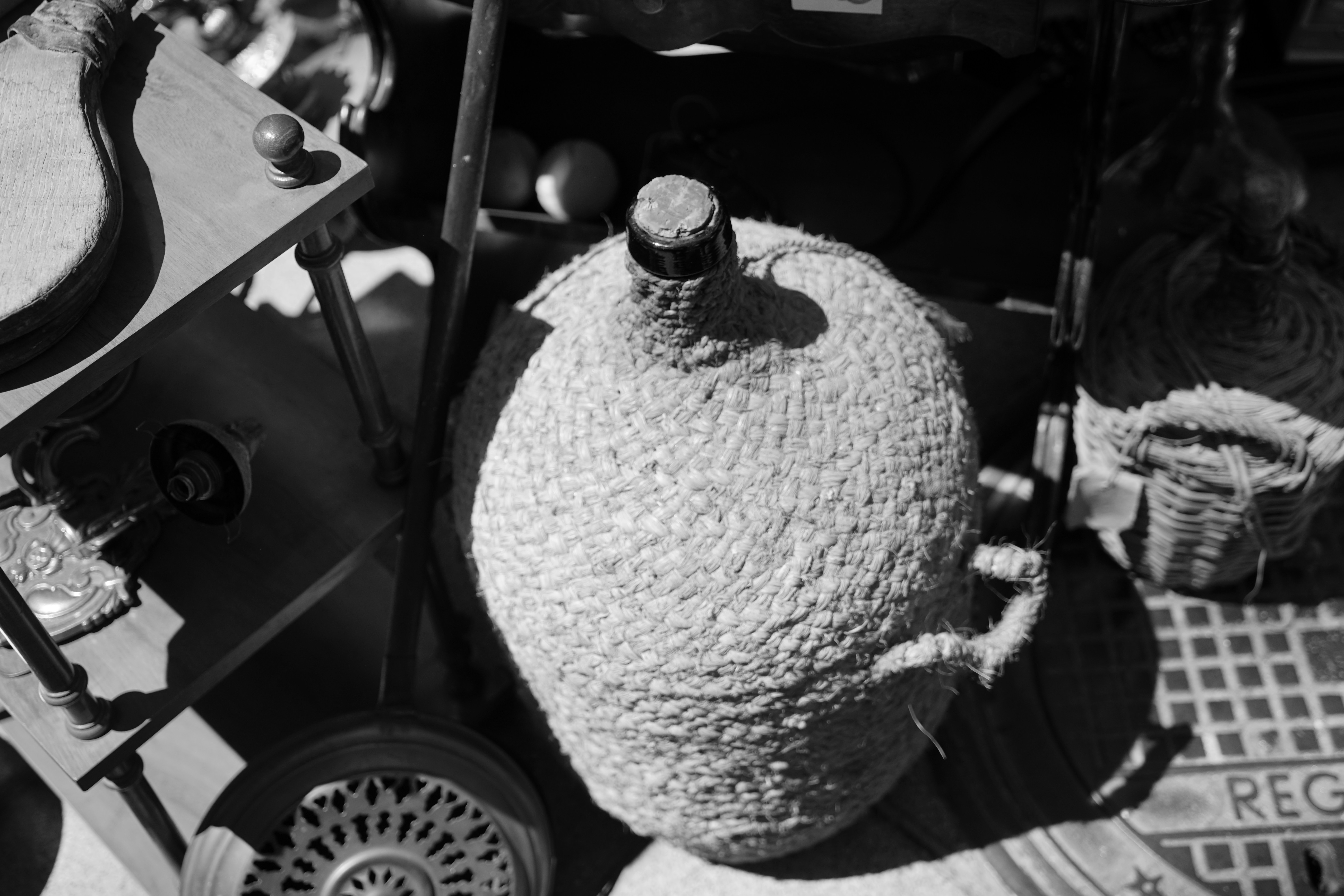 Rough-Textured Jug Anchors a Quiet Still-Life in Monochrome