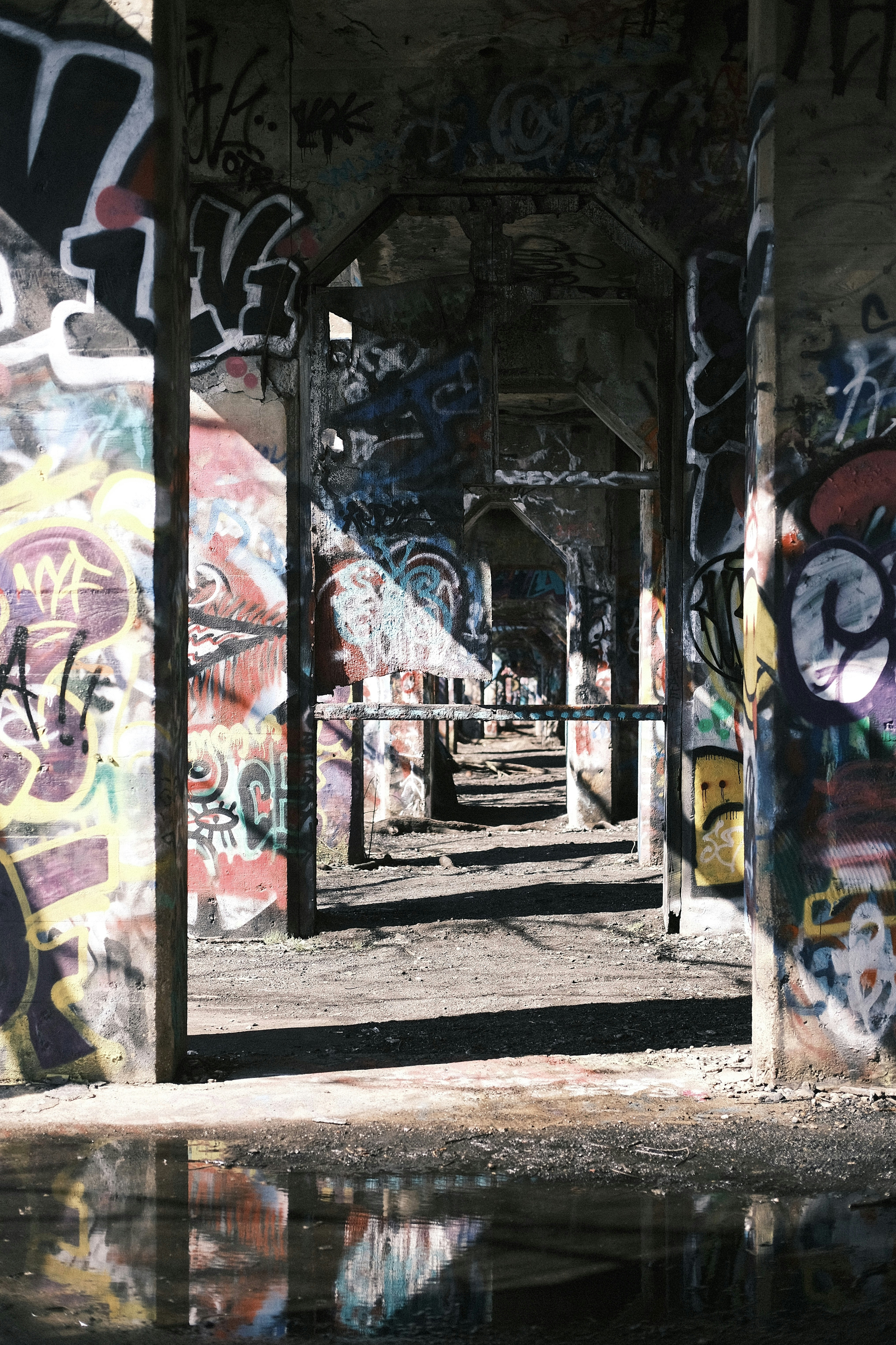 A bunch of graffiti on the side of a building photo – Free Philadelphia ...