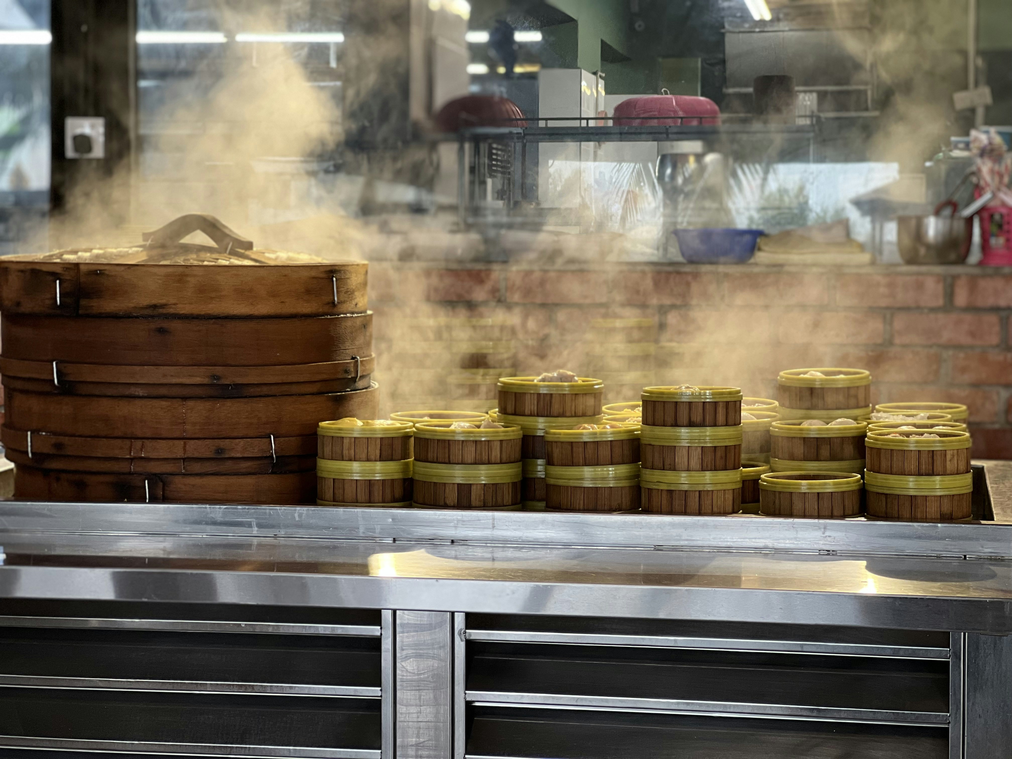 A kitchen filled with lots of wooden barrels photo – Free Brown Image ...