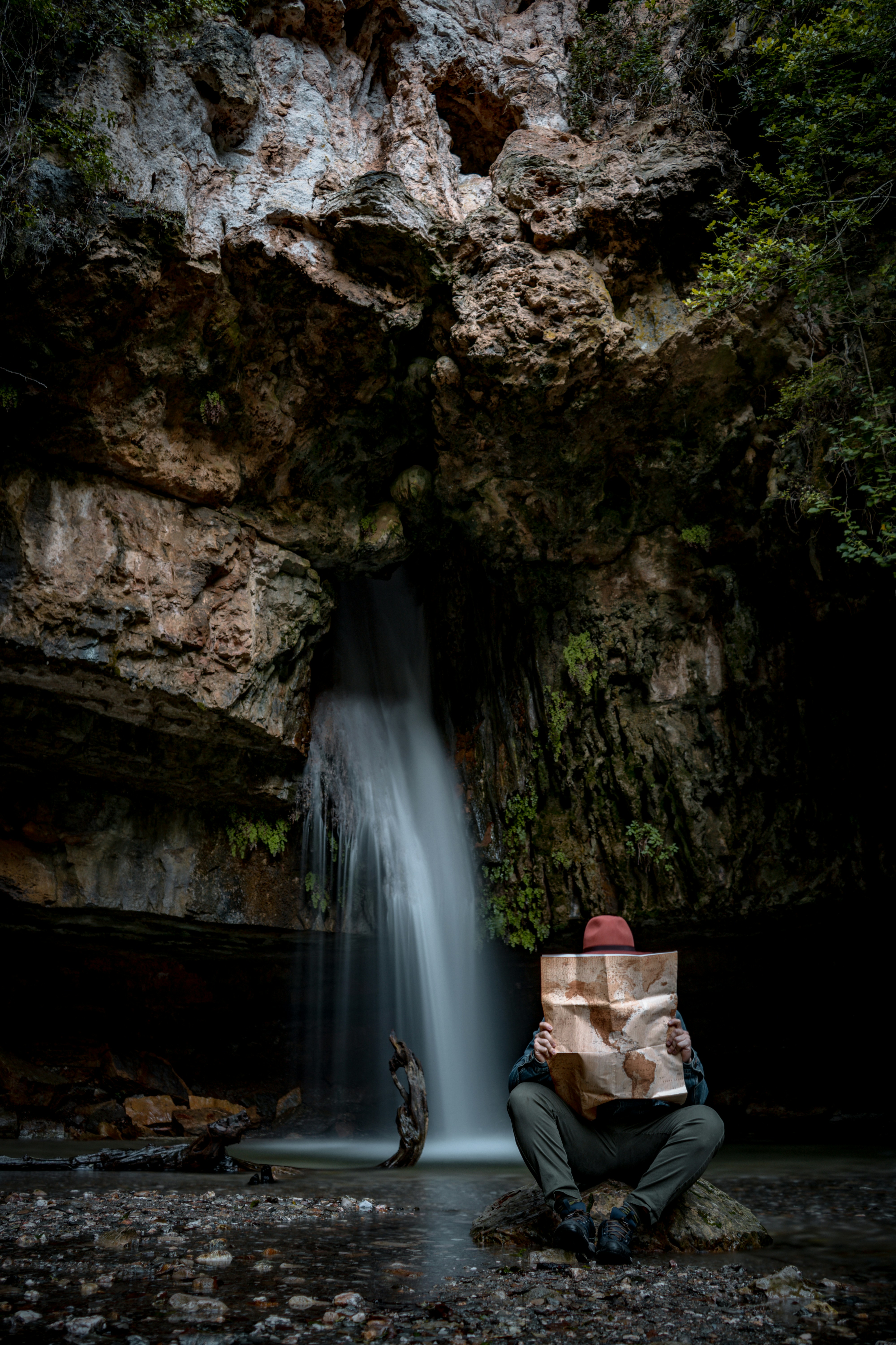 Map in Hand, a Quiet Moment by a Hidden Falls