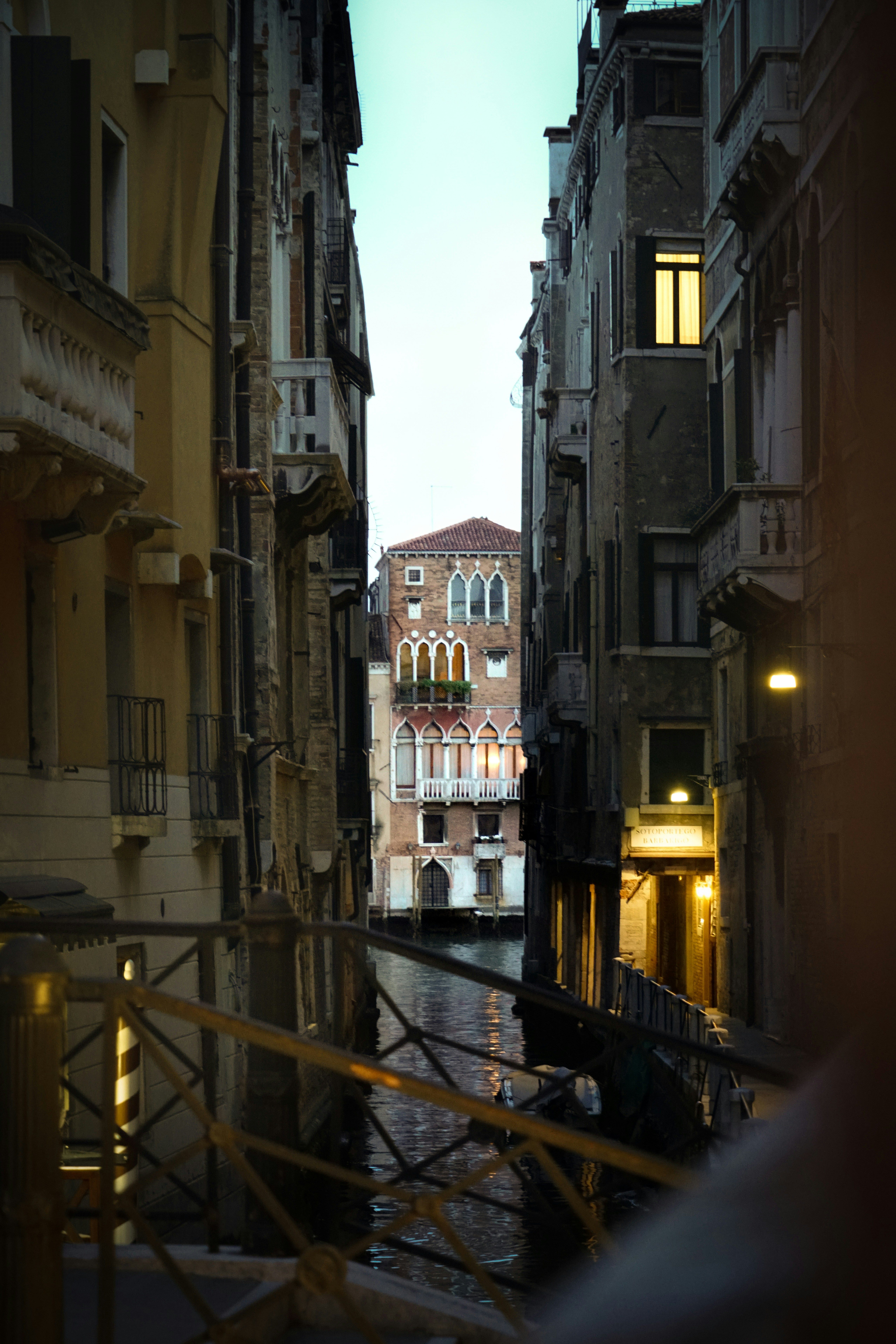 End of the Canal: A Venetian Facade Framed by Narrow Alleys