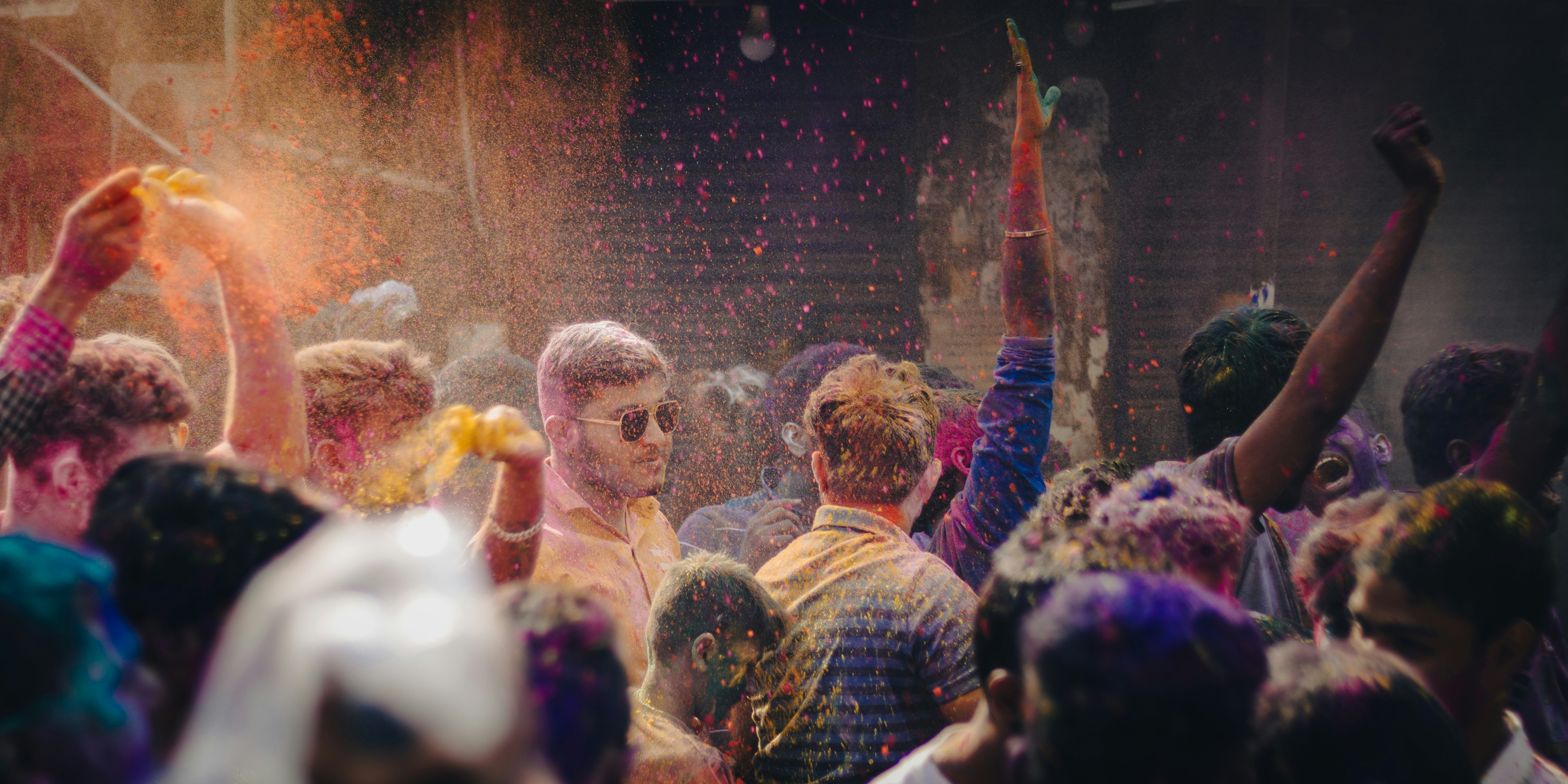 A group of people covered in colored powder photo – Free India Image on ...