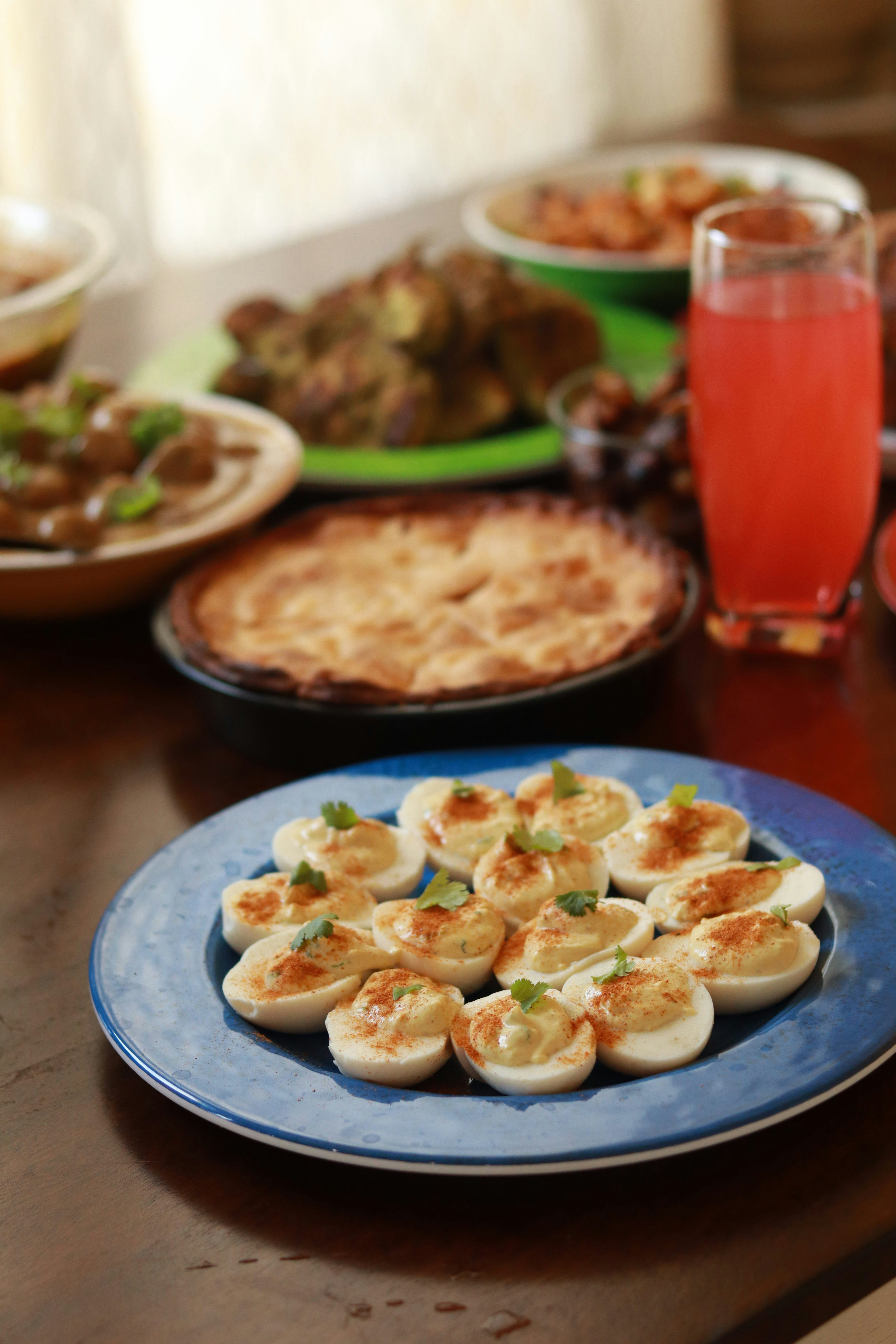Deviled Eggs on a Blue Plate: A Cozy Table of Shared Bites