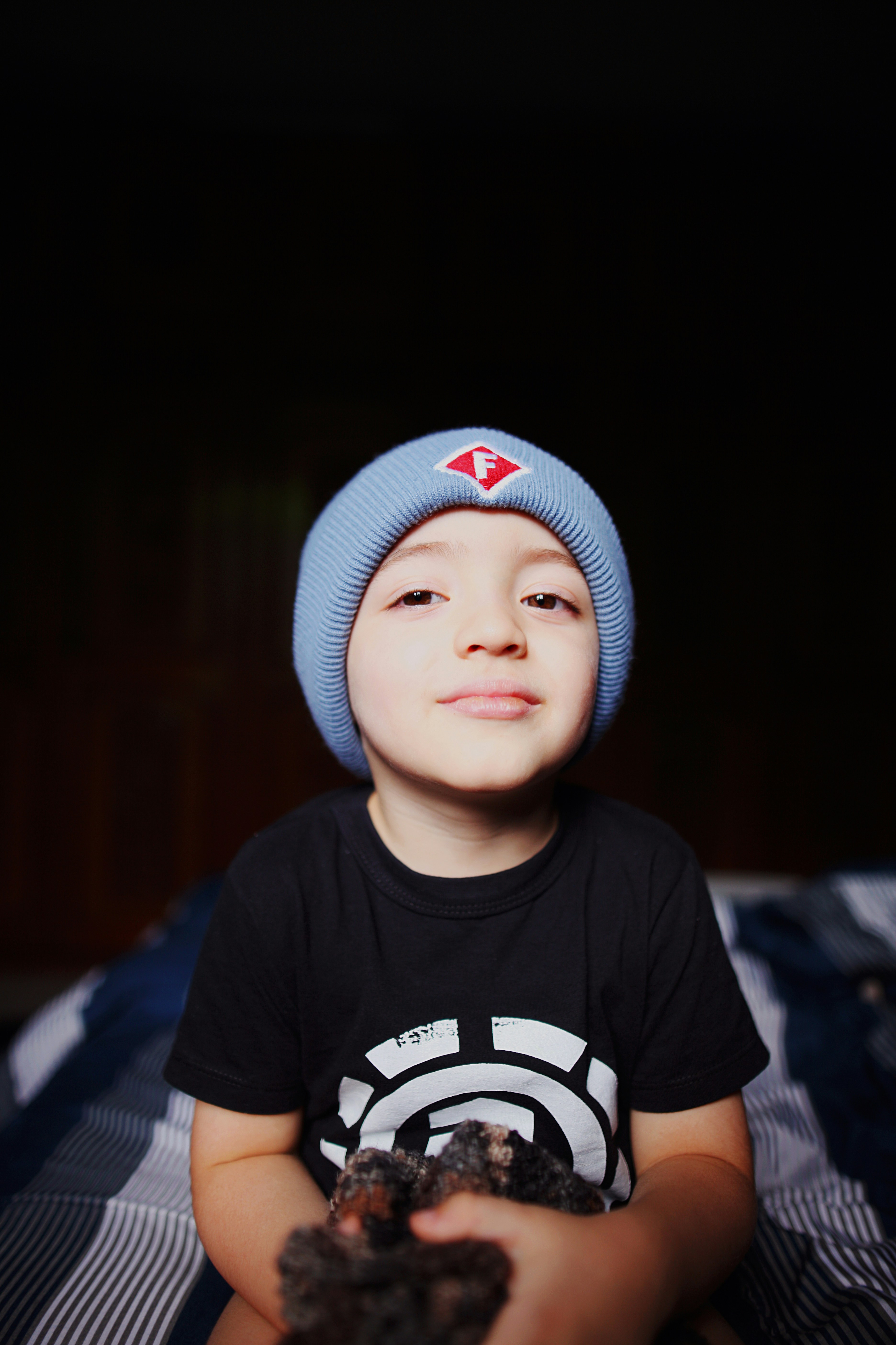 Under the Blue Beanie: A Quiet Portrait of Wonder