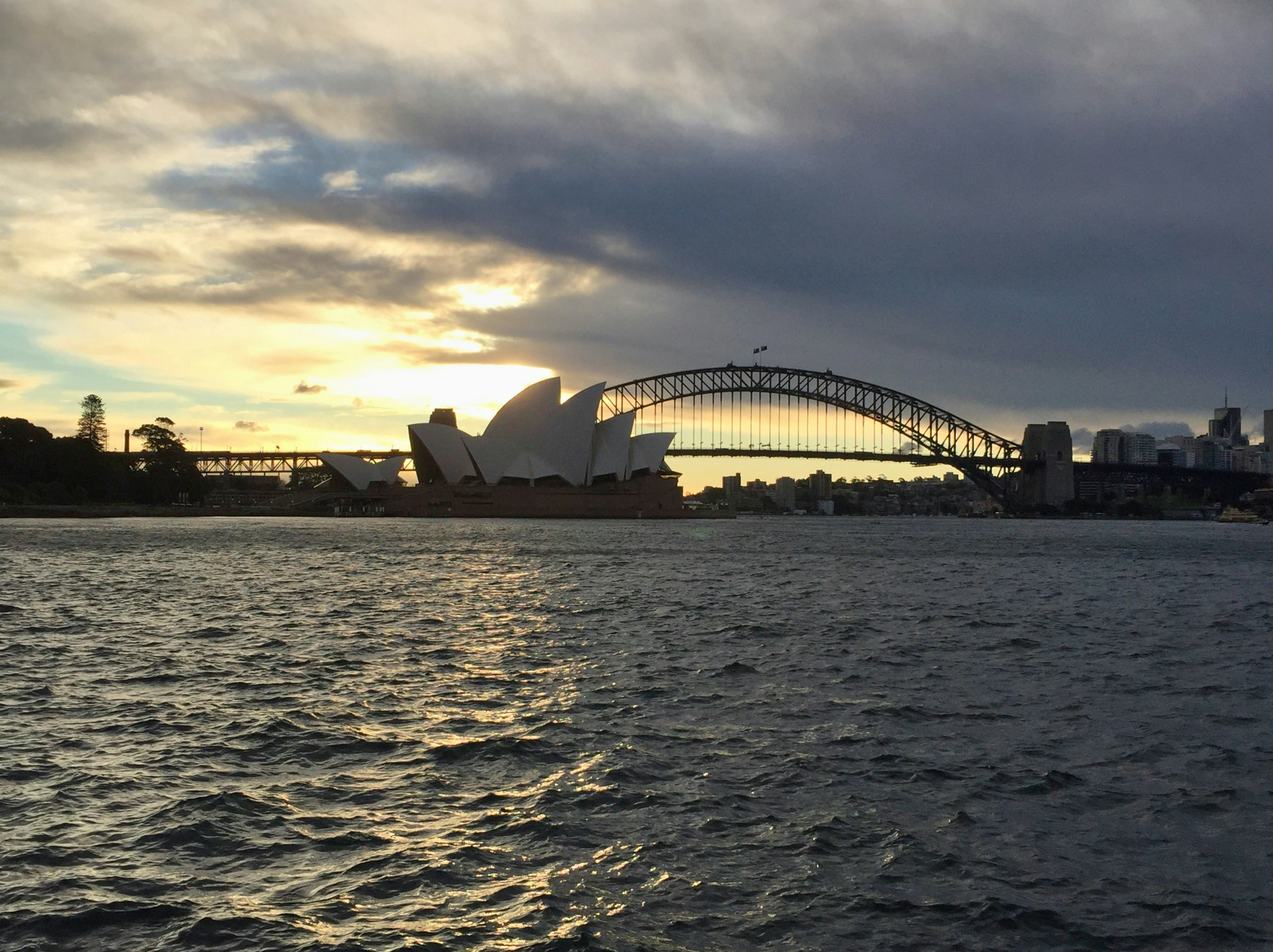 A romantic view of the Sydney Opera House and Sydney Harbour Bridge in New South Wales, Australia