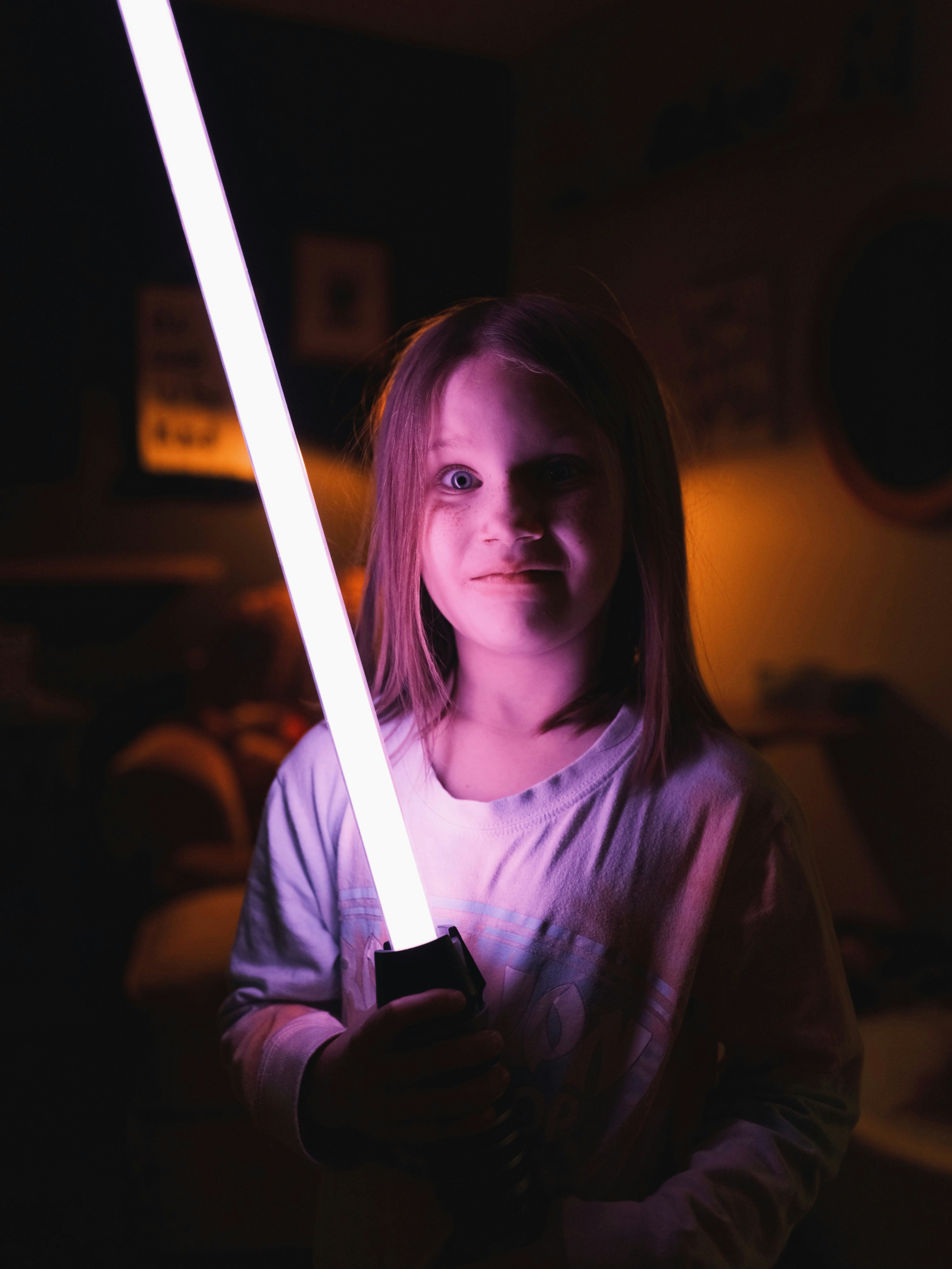 Glowblade in the Dark: Neon Portrait of a Girl with a Light Saber