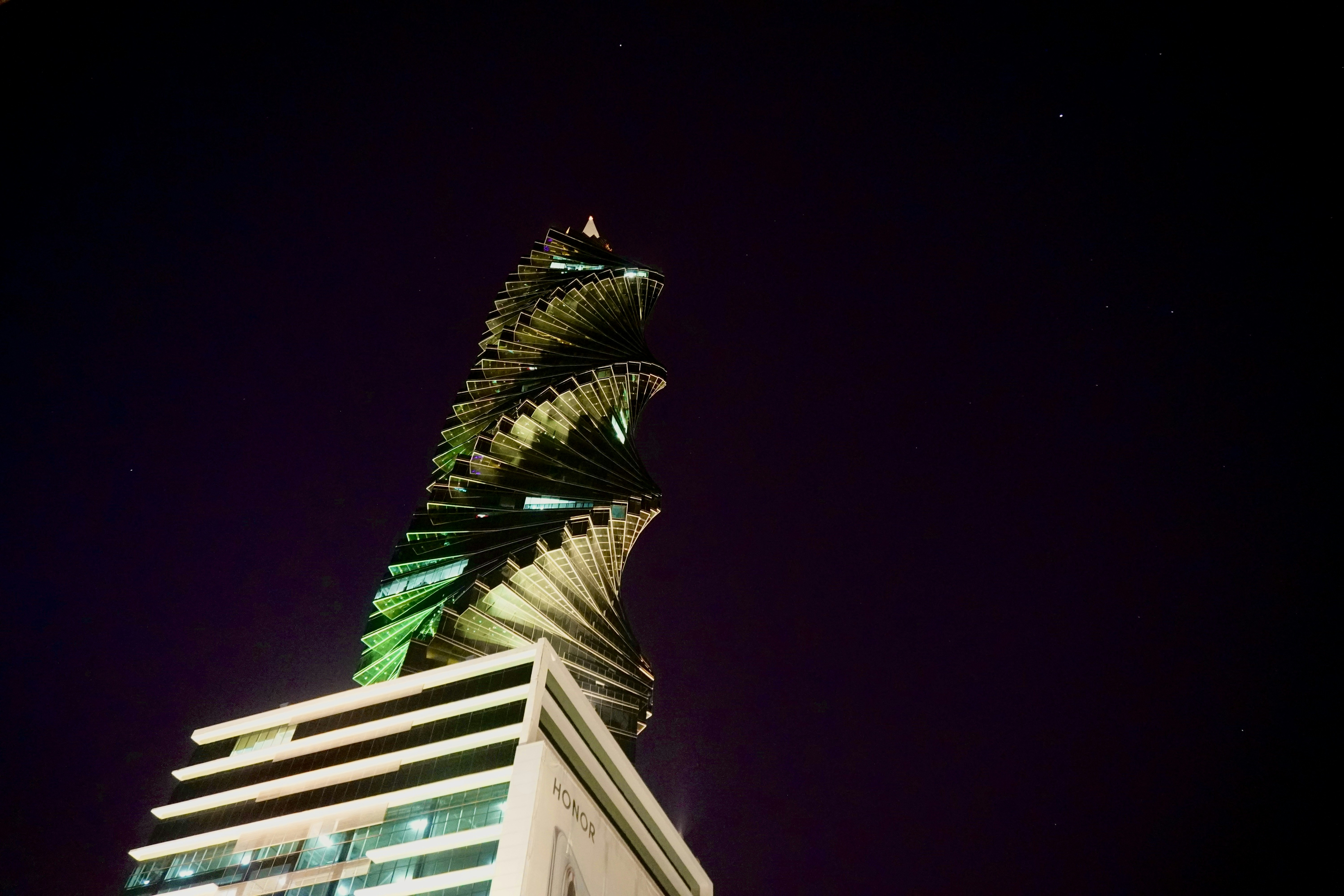 A very tall building with a very tall tower photo – Free F&f tower ...