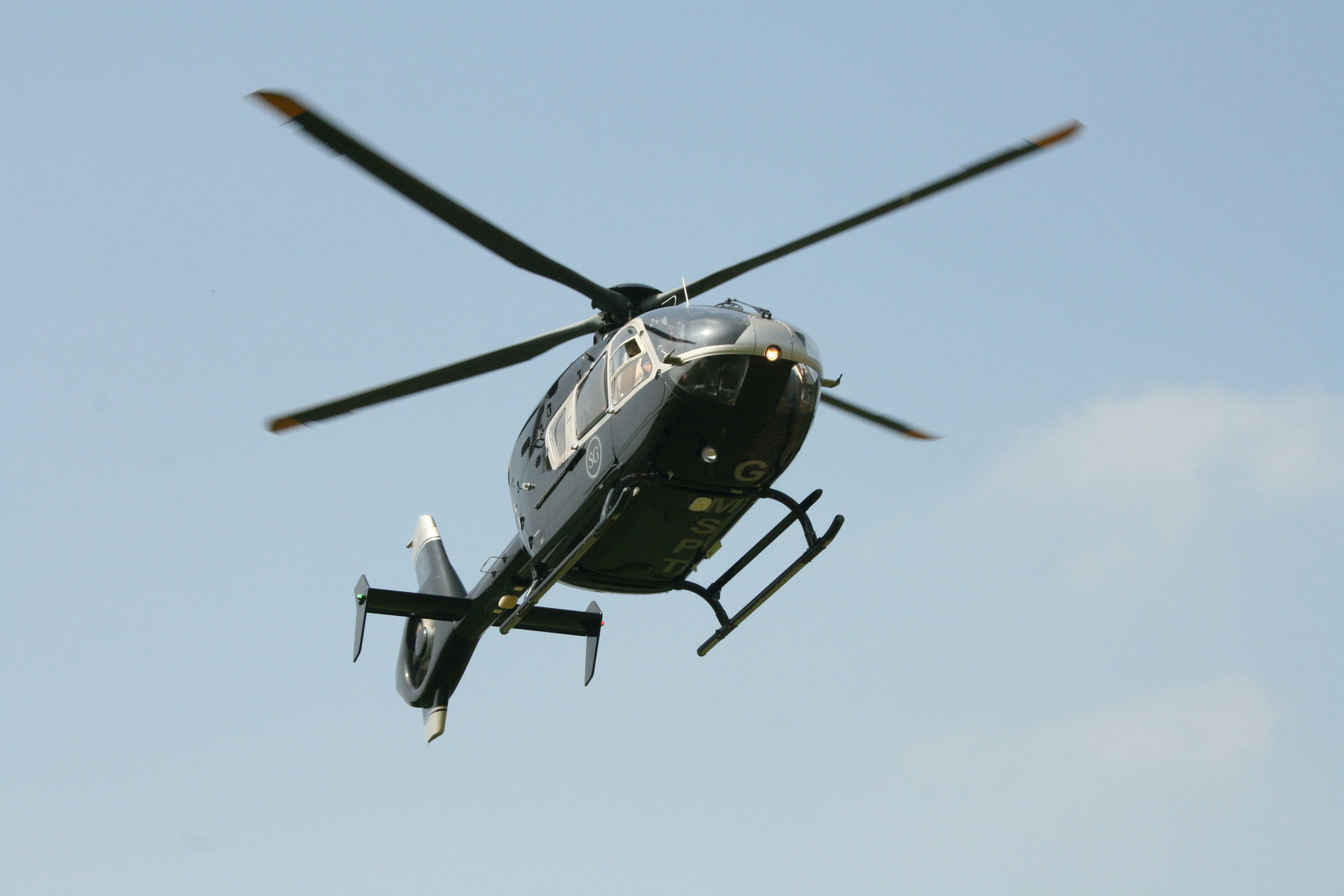 Helicopter landing on the football pitch at Horley Town Football Club
