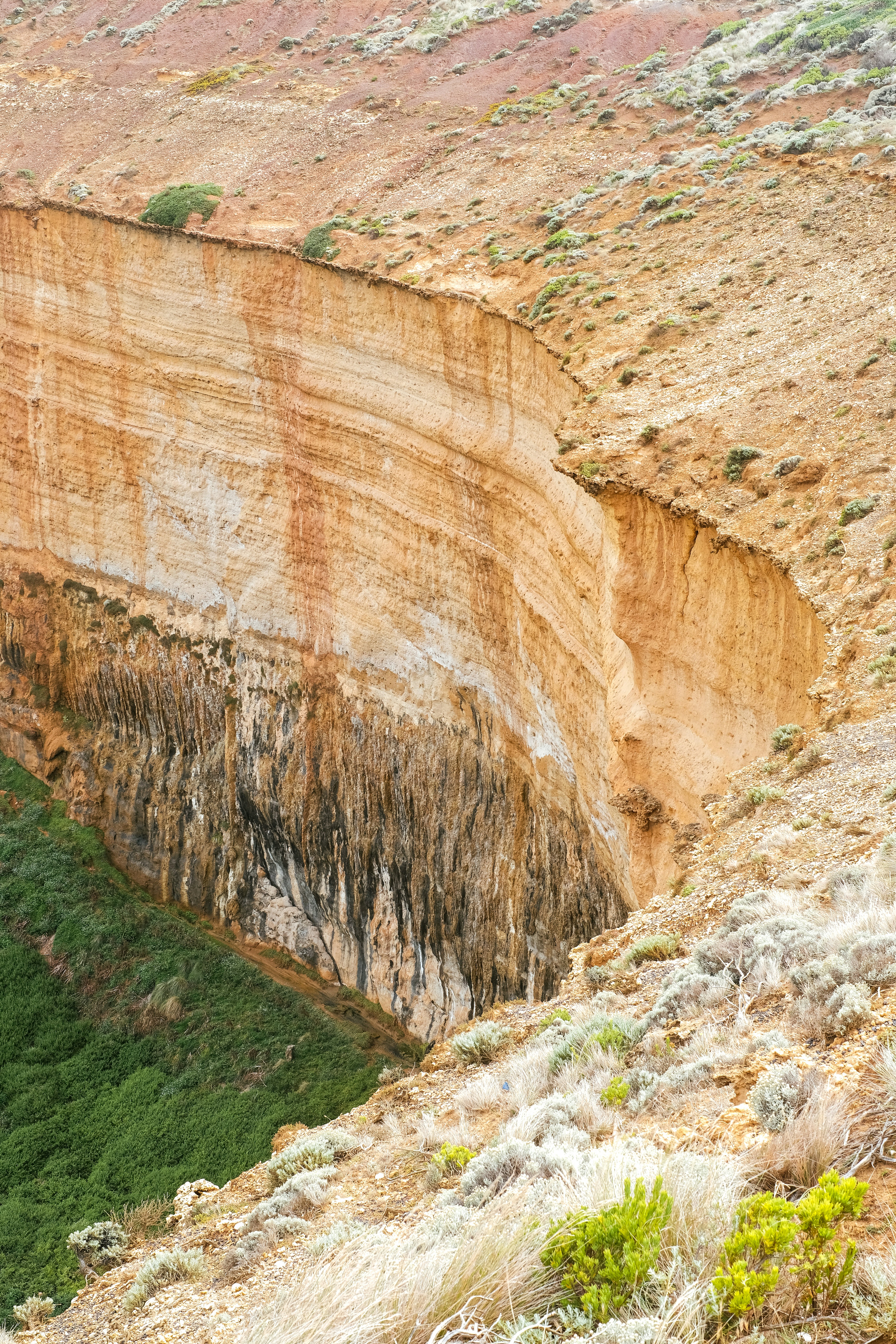 A large cliff with a very steep cliff face photo – Free Nature Image on ...