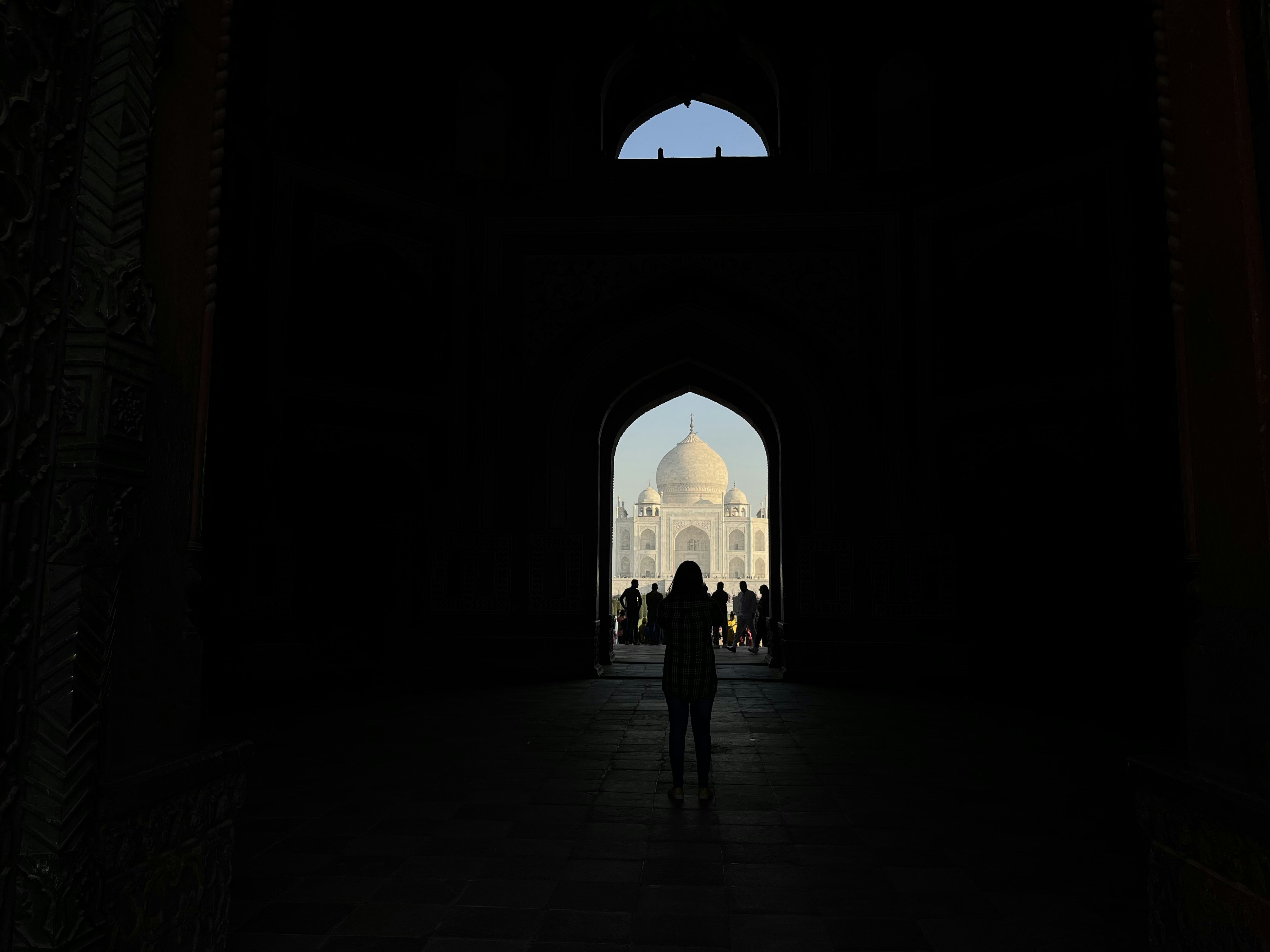 Silhouette toward the Taj: Gateway Archways Framing a Sacred Dawn